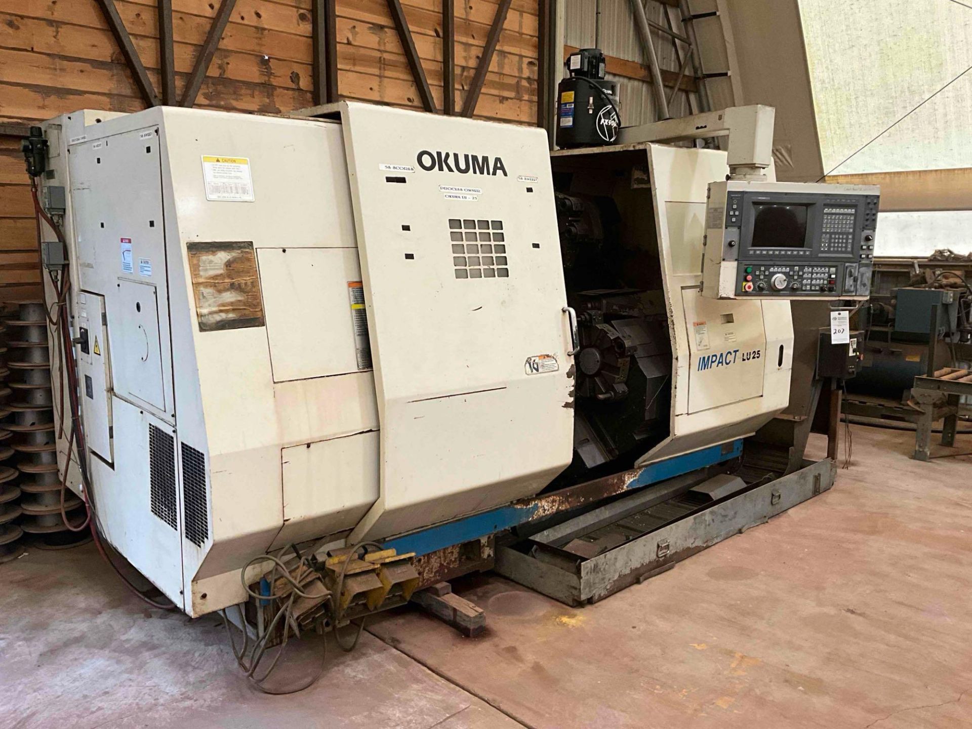 OKUMA LU-25 CNC LATHE IMPACT LU25 SN: 0490 CHUCK SIZE: 10" BAR CAPACITY ...
