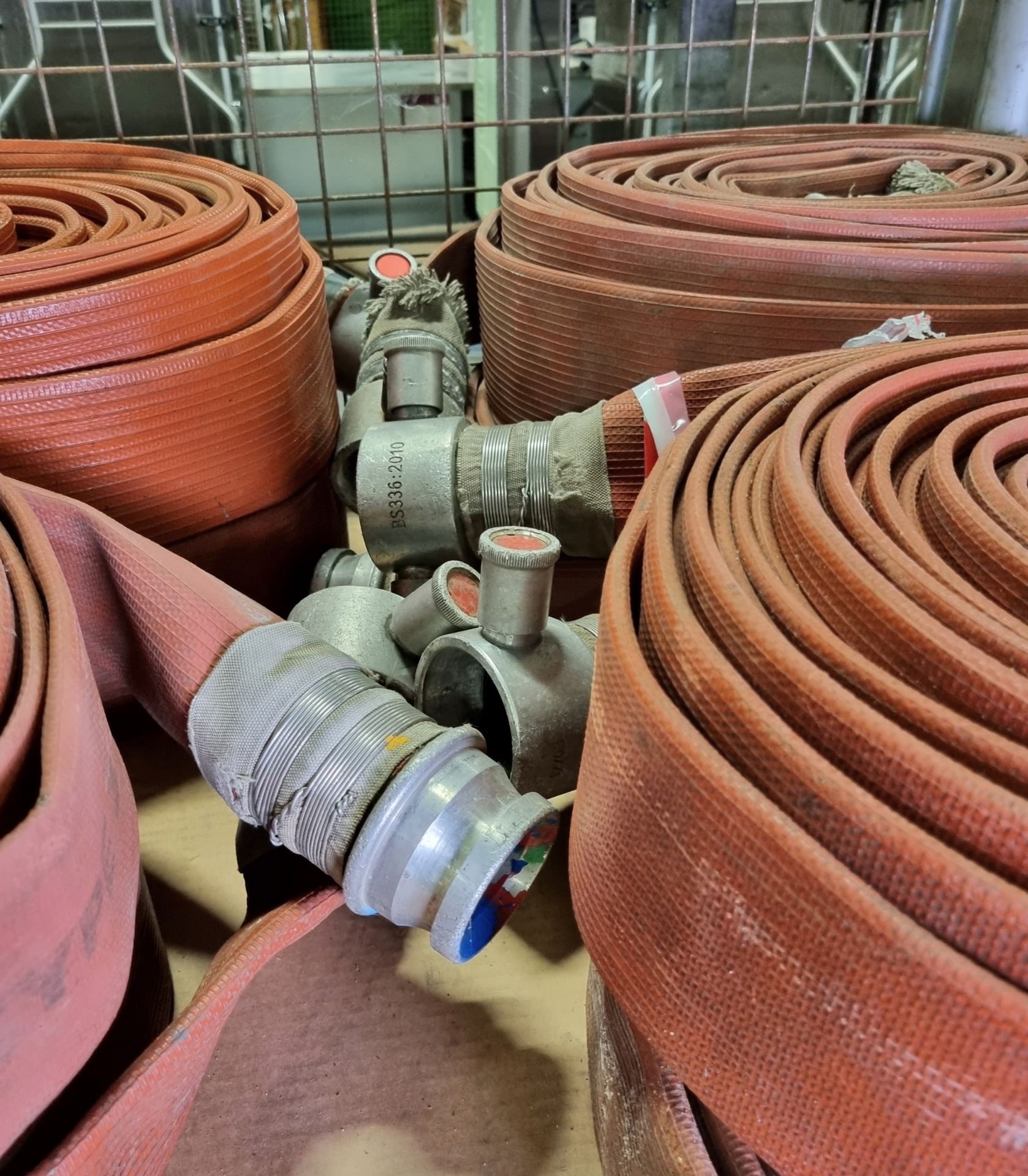 8x Red 70mm lay flat hoses with couplings - approx 23m in length