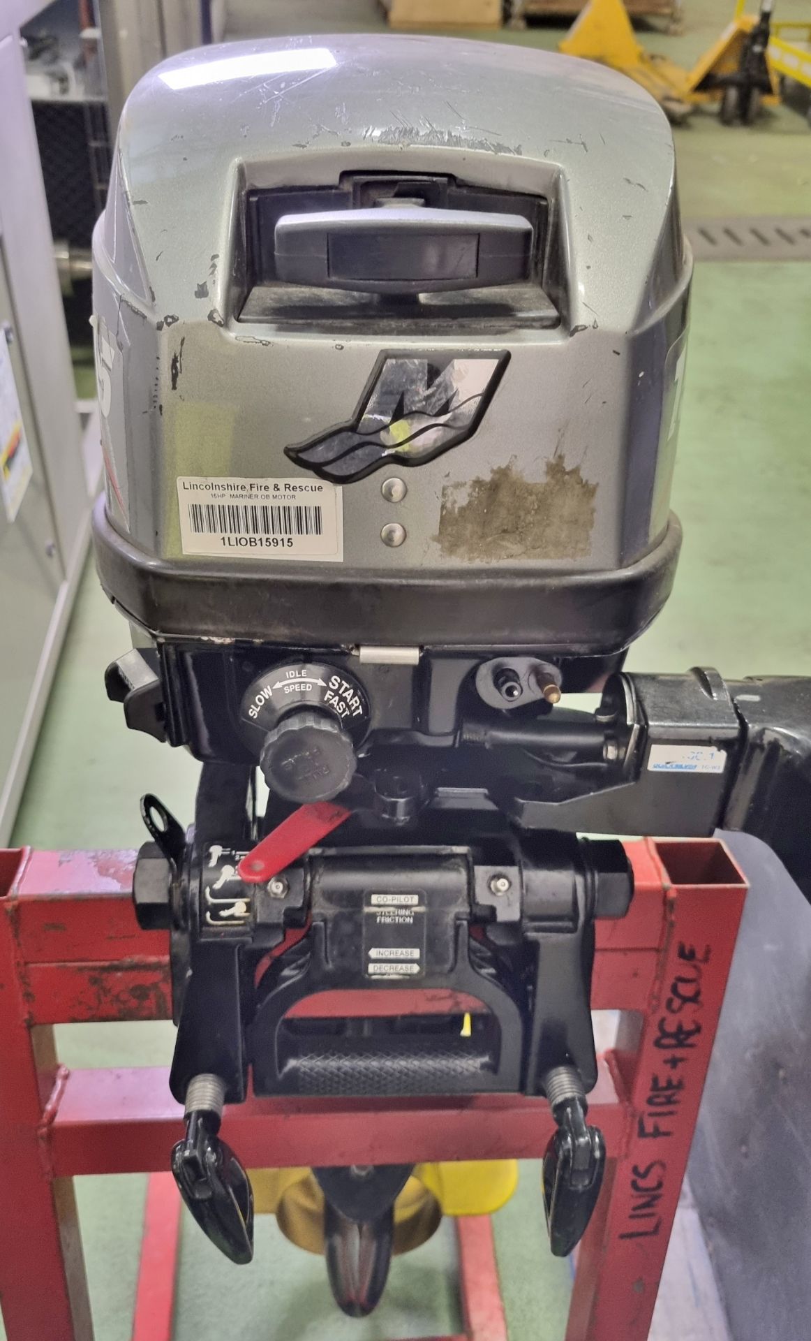 Mariner 15 HP outboard motor on stand - Serial No: OP536915