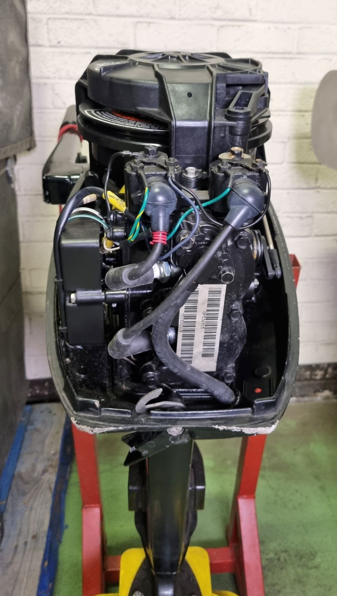 Mariner 15 HP outboard motor on stand - Serial No: OP536915