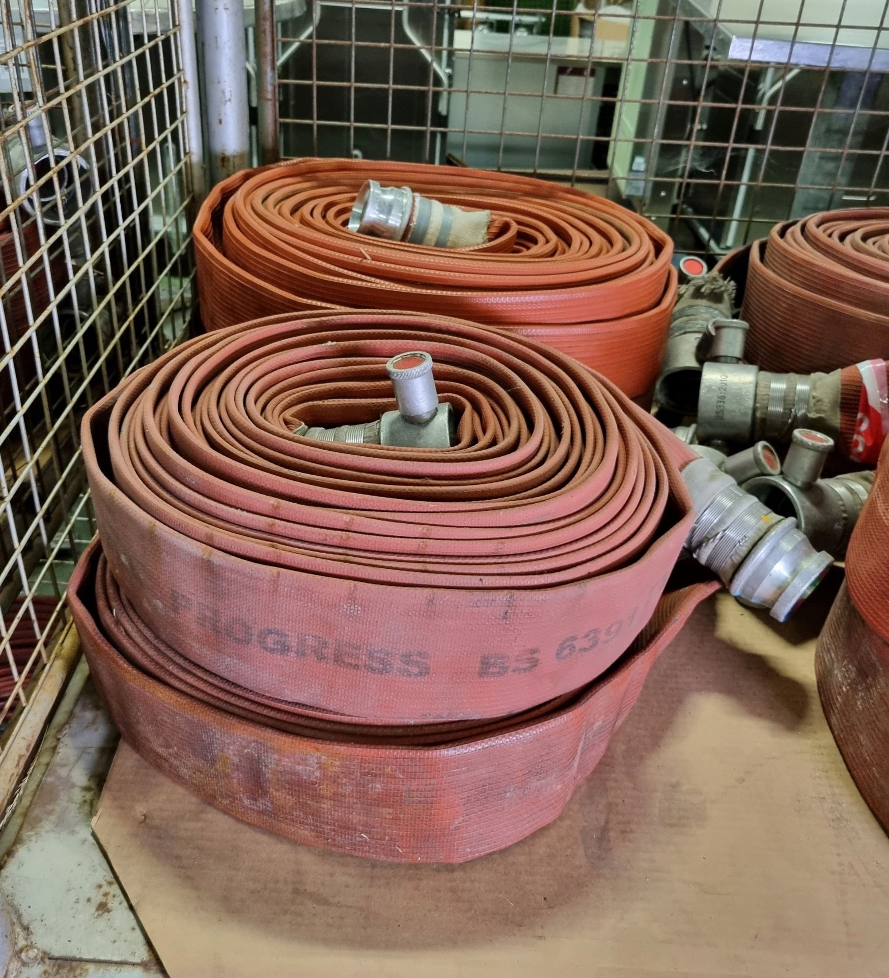 8x Red 70mm lay flat hoses with couplings - approx 23m in length