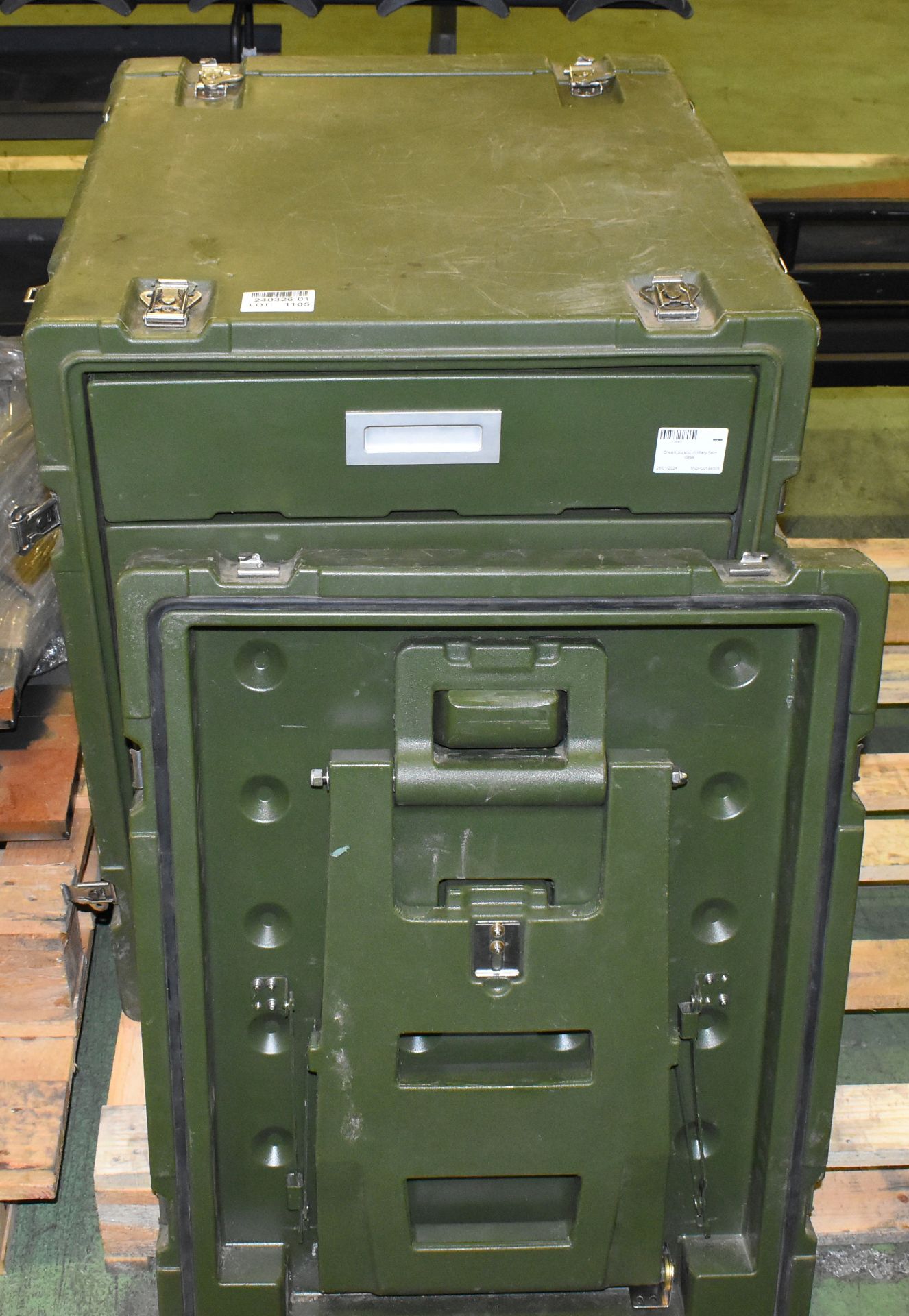 Green plastic military field desk in transit case
