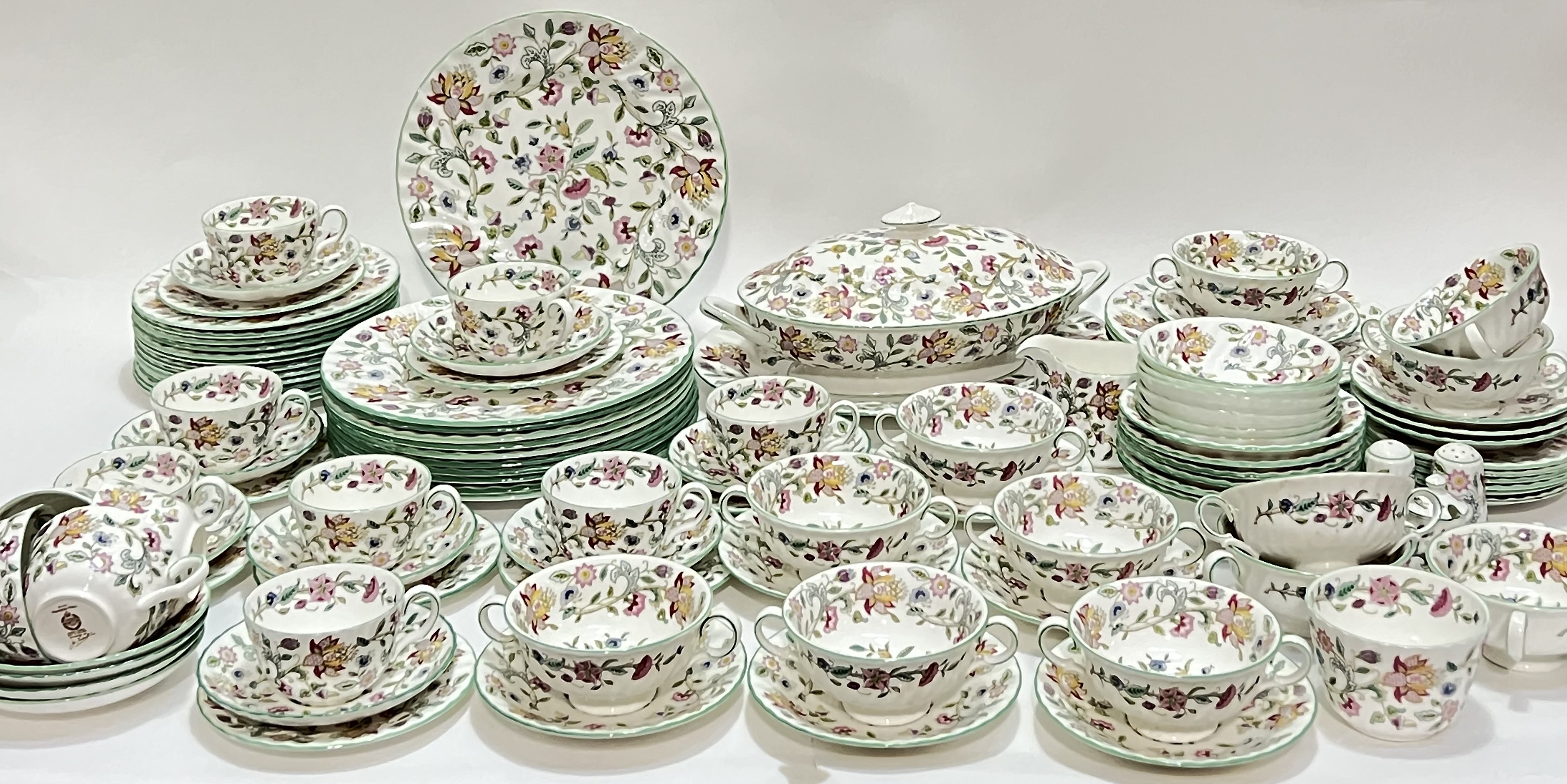 A Minton Haddon Hall pattern tea and dinner service comprising twelve ...