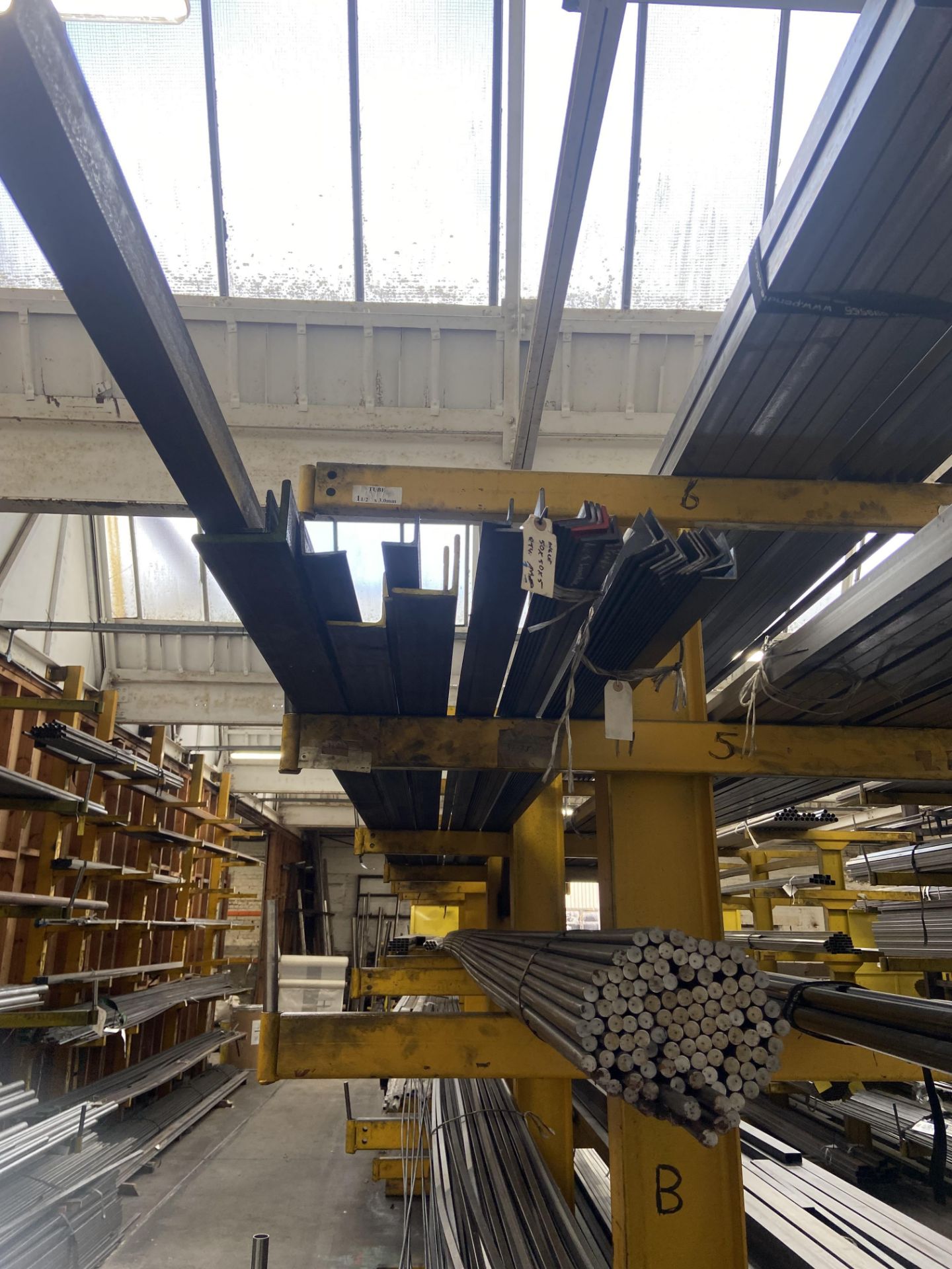 Steel Bar & Box Section Stock, on four tiers of one side of stock rack ...