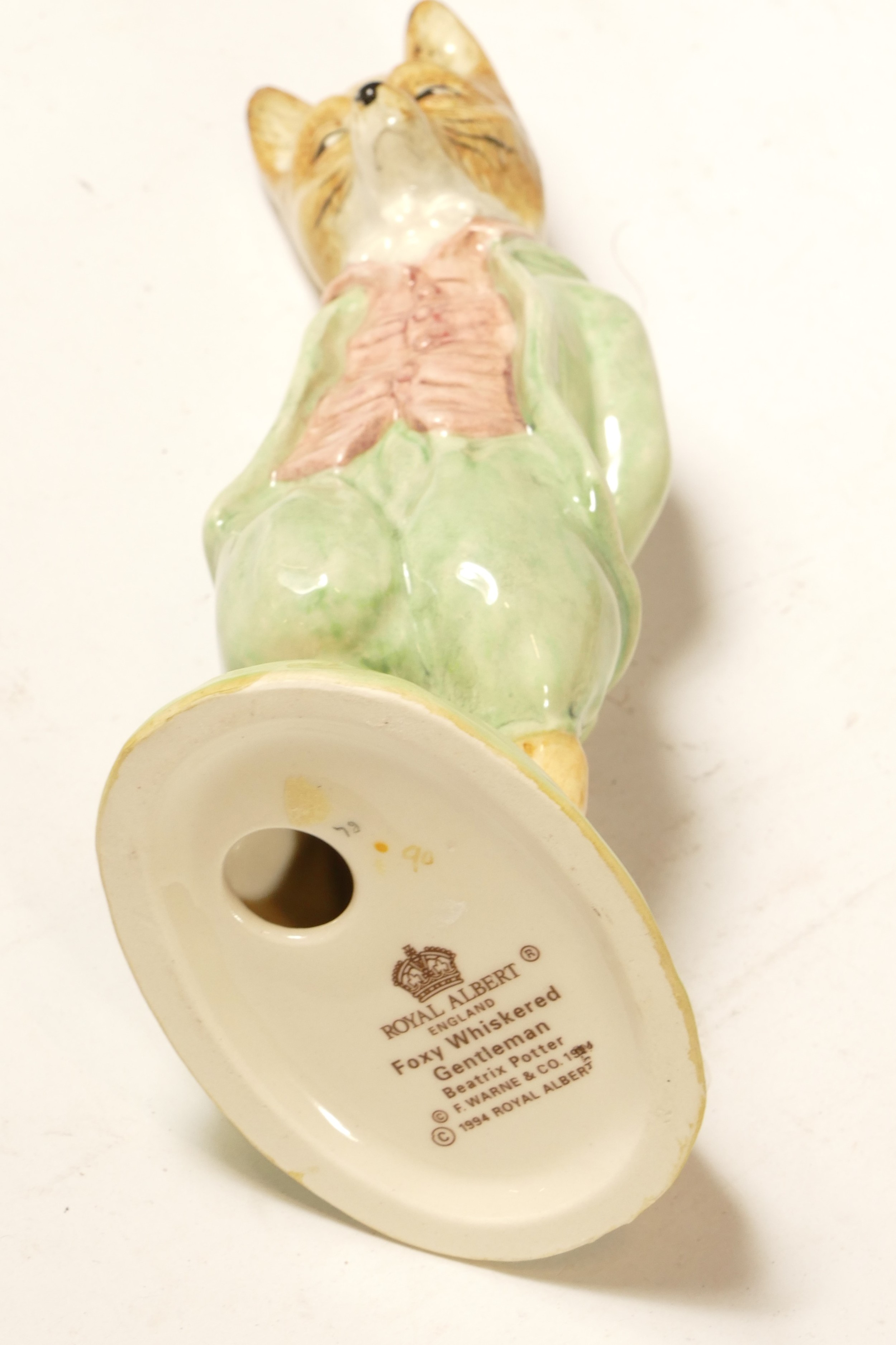 A collection of porcelain figures, to include Wade Whimsies, Rowan ...