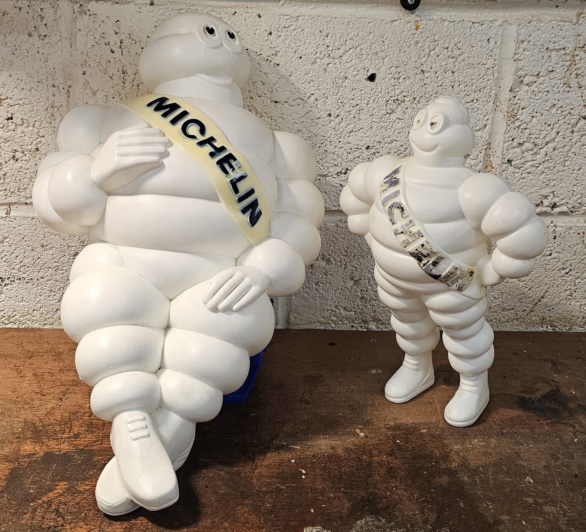 A Bibendum or Michelin Man plastic seated lamp, lacking lighting, 50cm ...