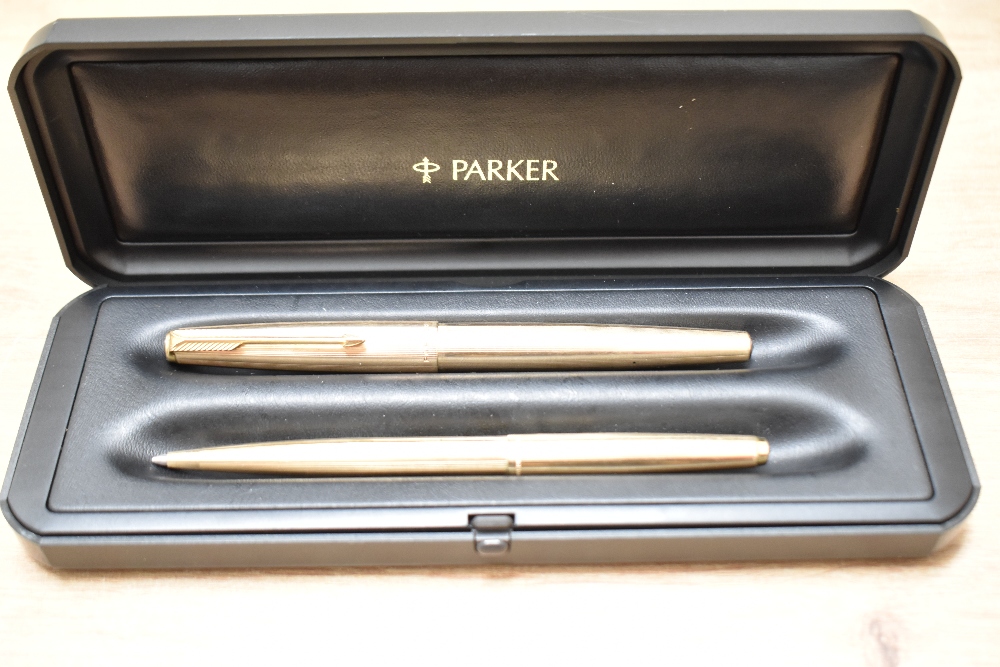 A boxed Parker 61 Insignia capillary fill fountain pen and ballpoint ...