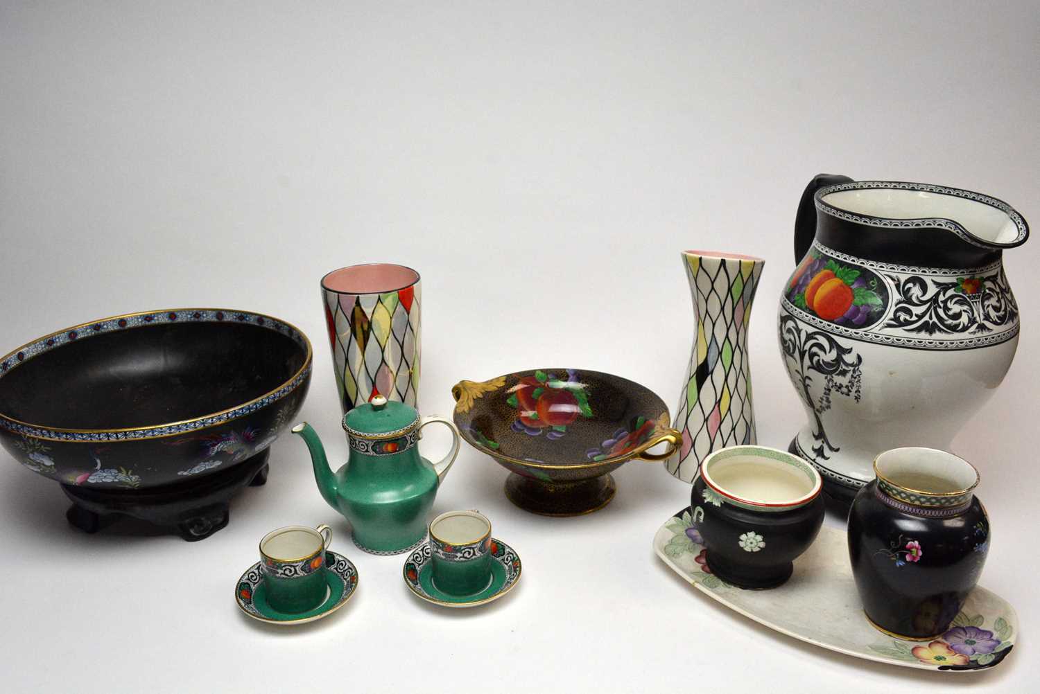 A pair of Maling ‘Harlequin’ pattern vases, the tallest 25cms; together ...