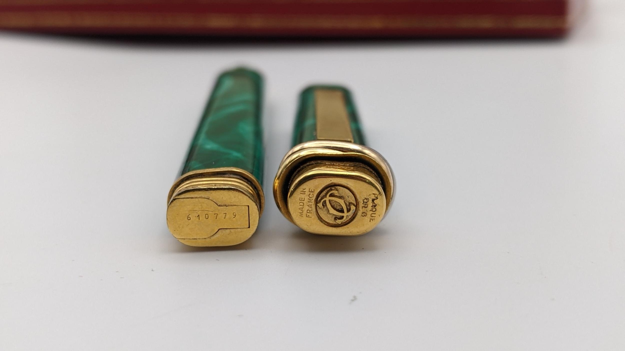 A Cartier malachite lacquer ballpoint pen, with box, numbered ...