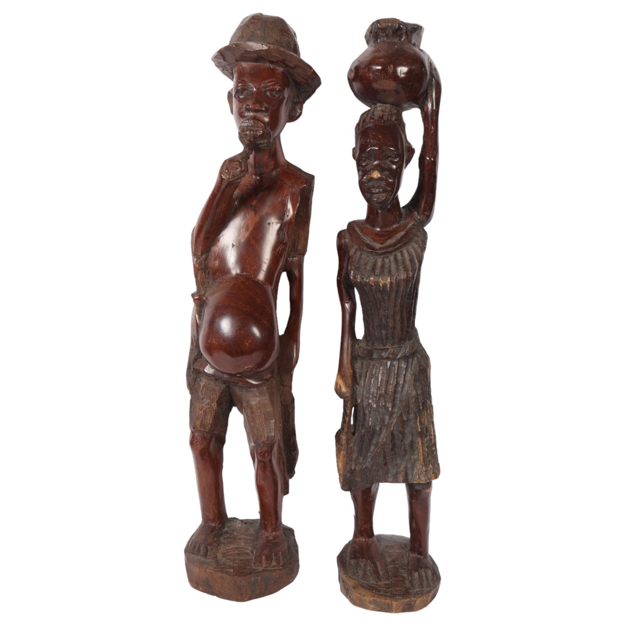 2 ornately heavily carved African figures, H72cm