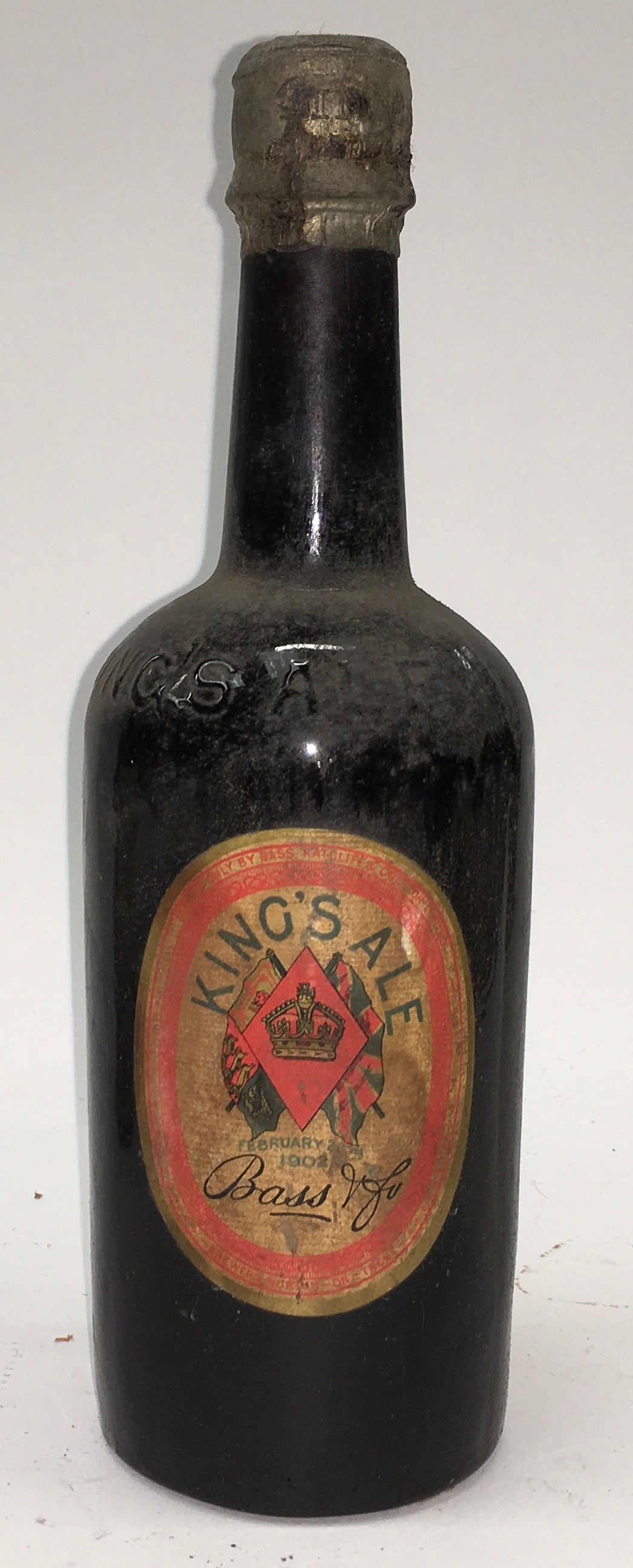 Lot consisting of two rare bottled beers to include a 1902 Bass Kings ...