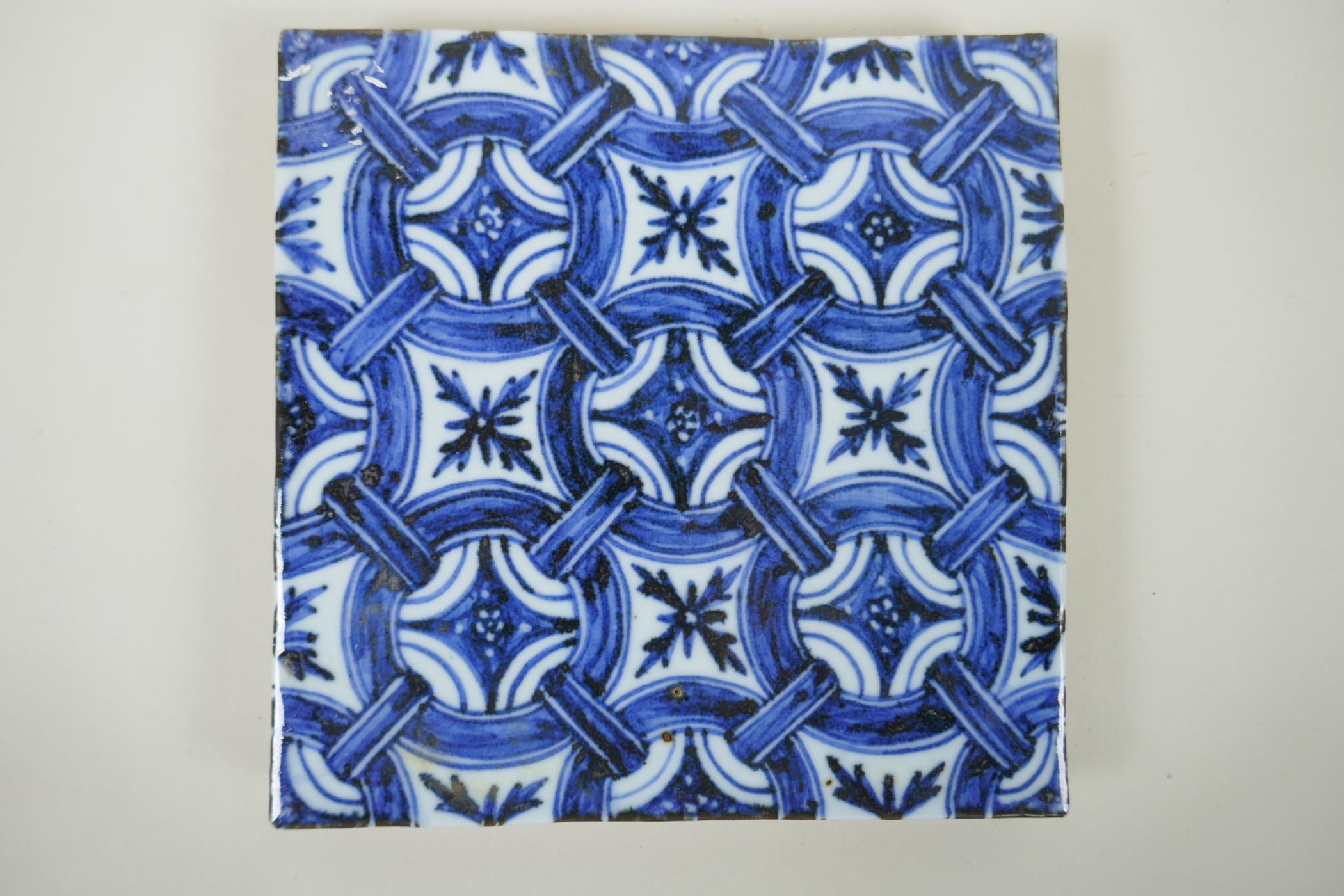 A Chinese blue and white porcelain temple tile with repeating pattern ...