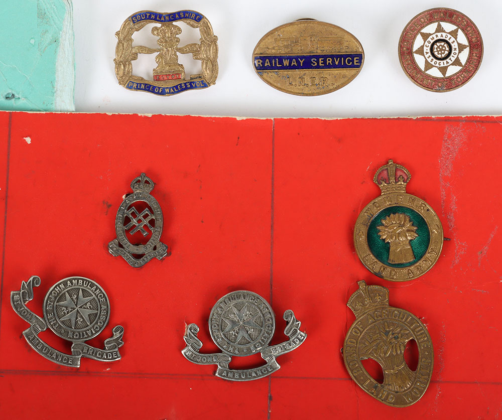 Selection of various badges to include Home Front, a Territorial Army ...