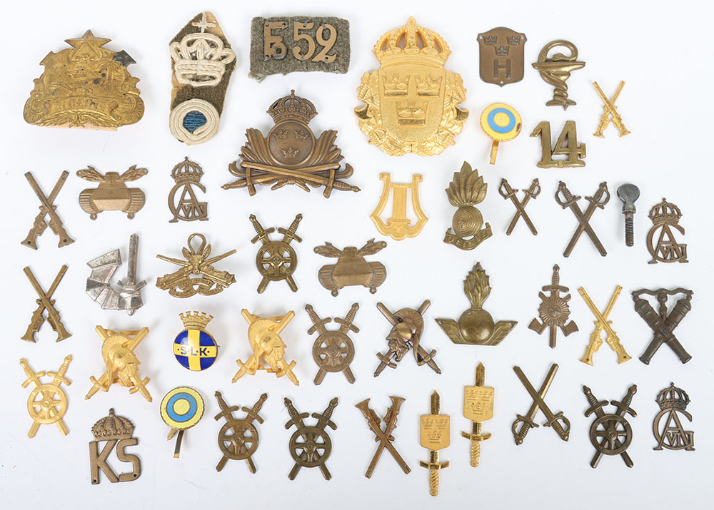 Job lot of mainly Swedish badges. Lot includes Swedish Police cap badge ...