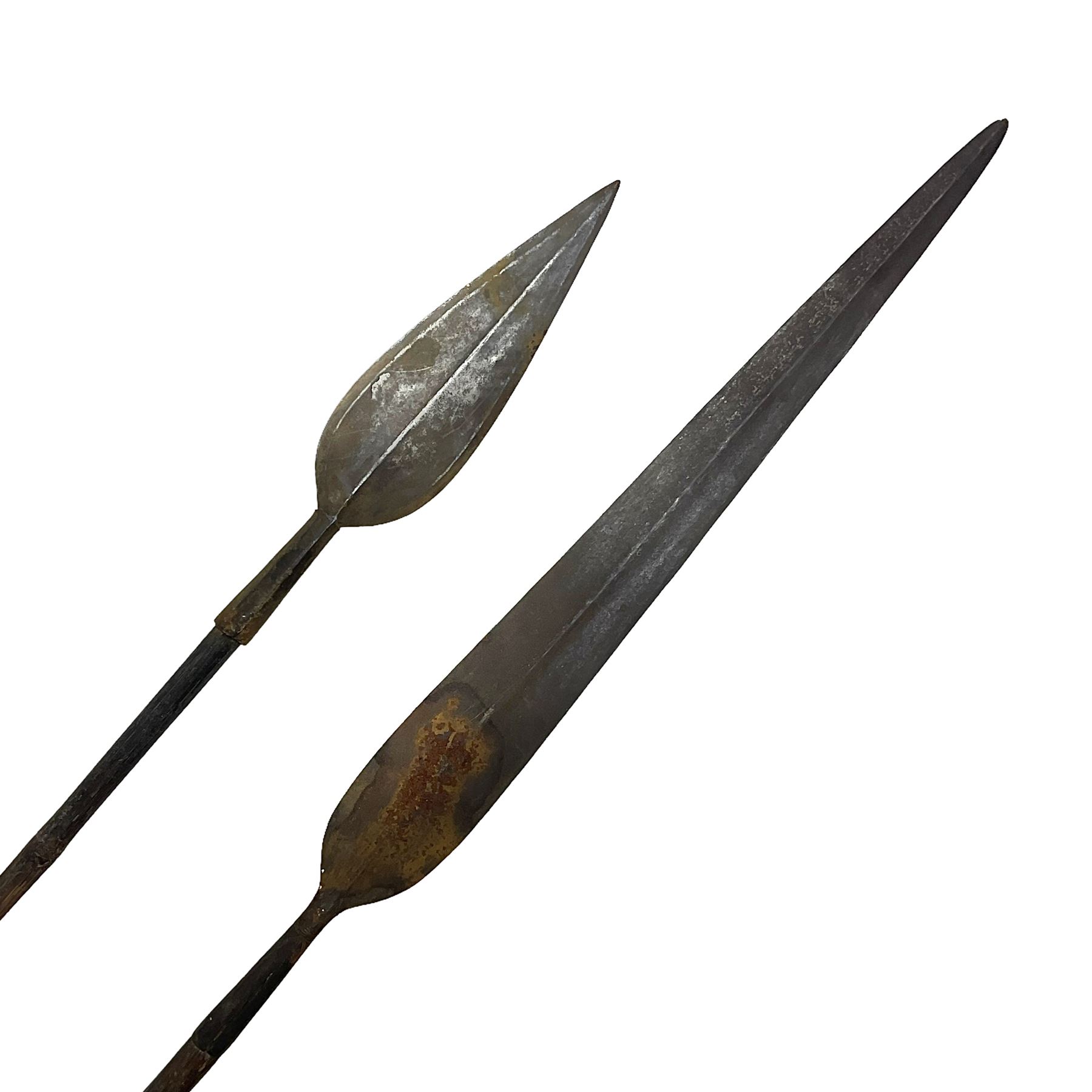 Native long-shafted spear, the large iron head with central medial ...
