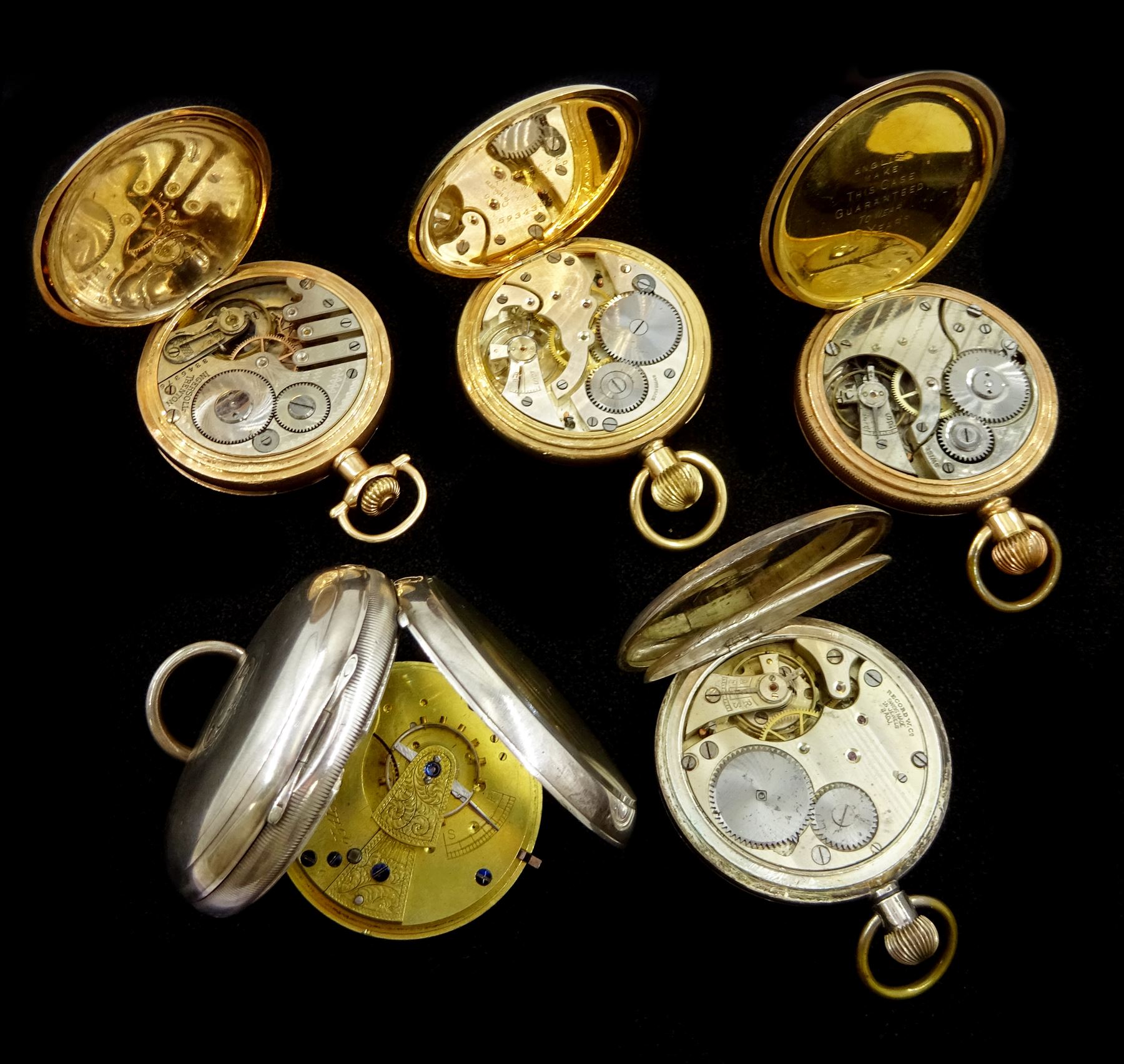 Three early 20th century gold-plated keyless lever pocket watches ...