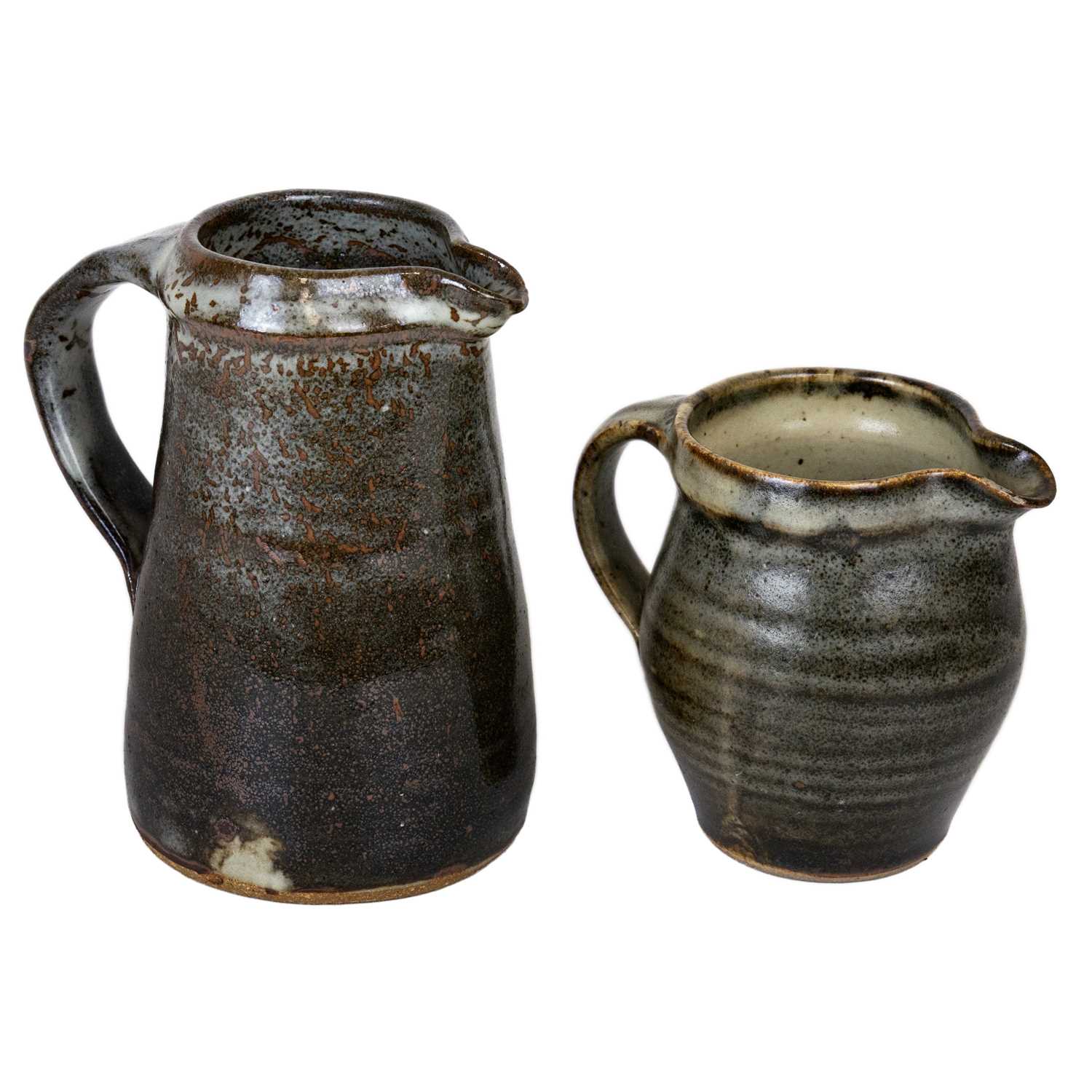 Two Leach Pottery standard ware jugsHeight 7 cm and 11.5 cmEach with ...