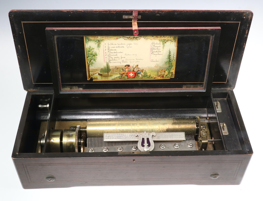 A 19th Century Swiss cylinder music box playing 8 aires contained in a ...