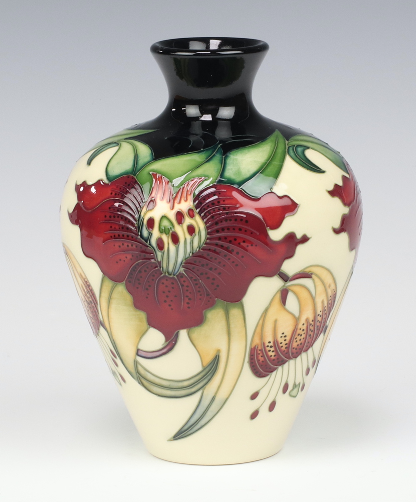 A Moorcroft Anna Lily cream ground vase, designed by Nicola Slaney ...