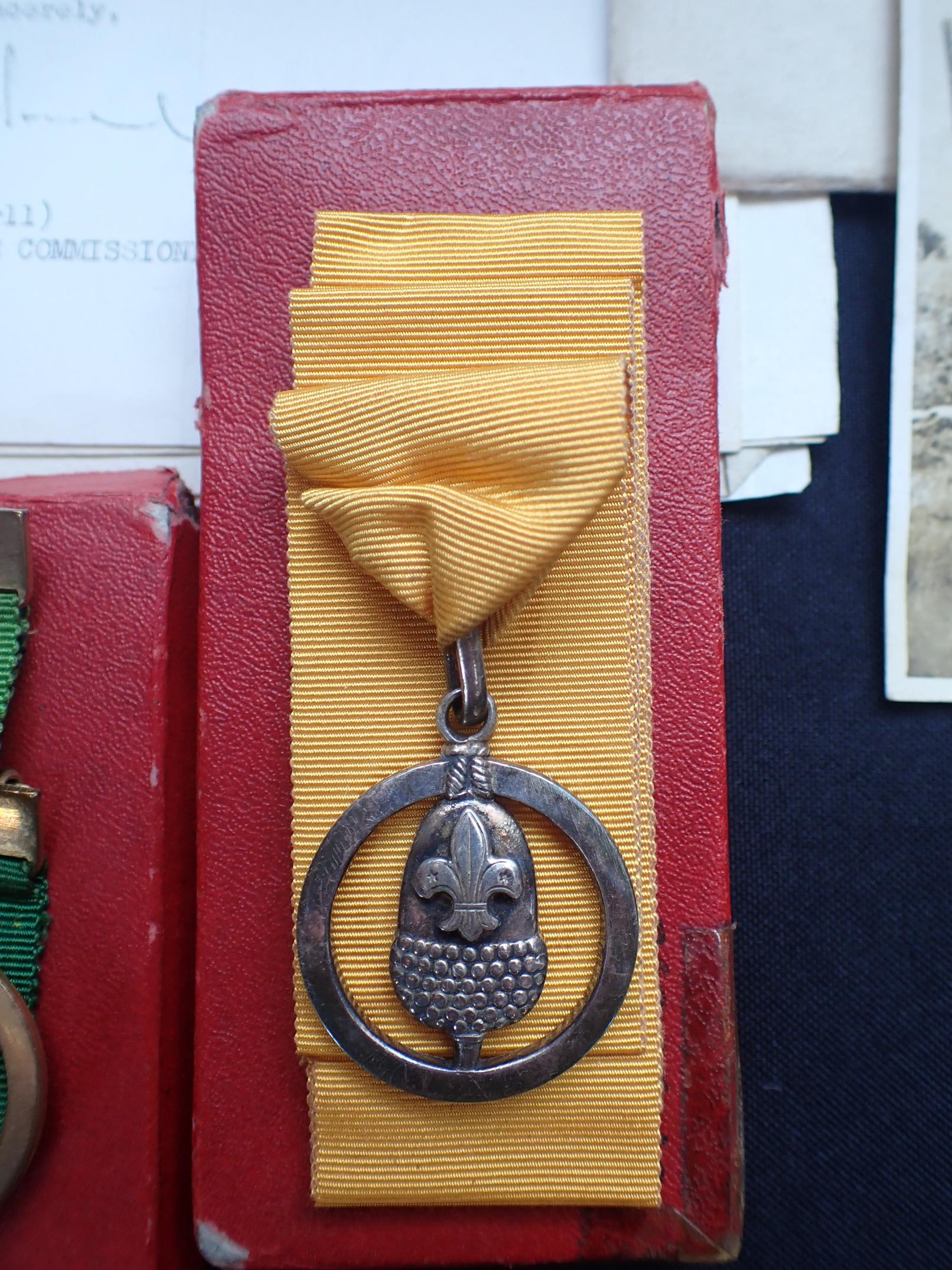 SCOUTING: A BOY SCOUTS ASSOCIATION SILVER ACORN MEDAL, AWARDED TO ...