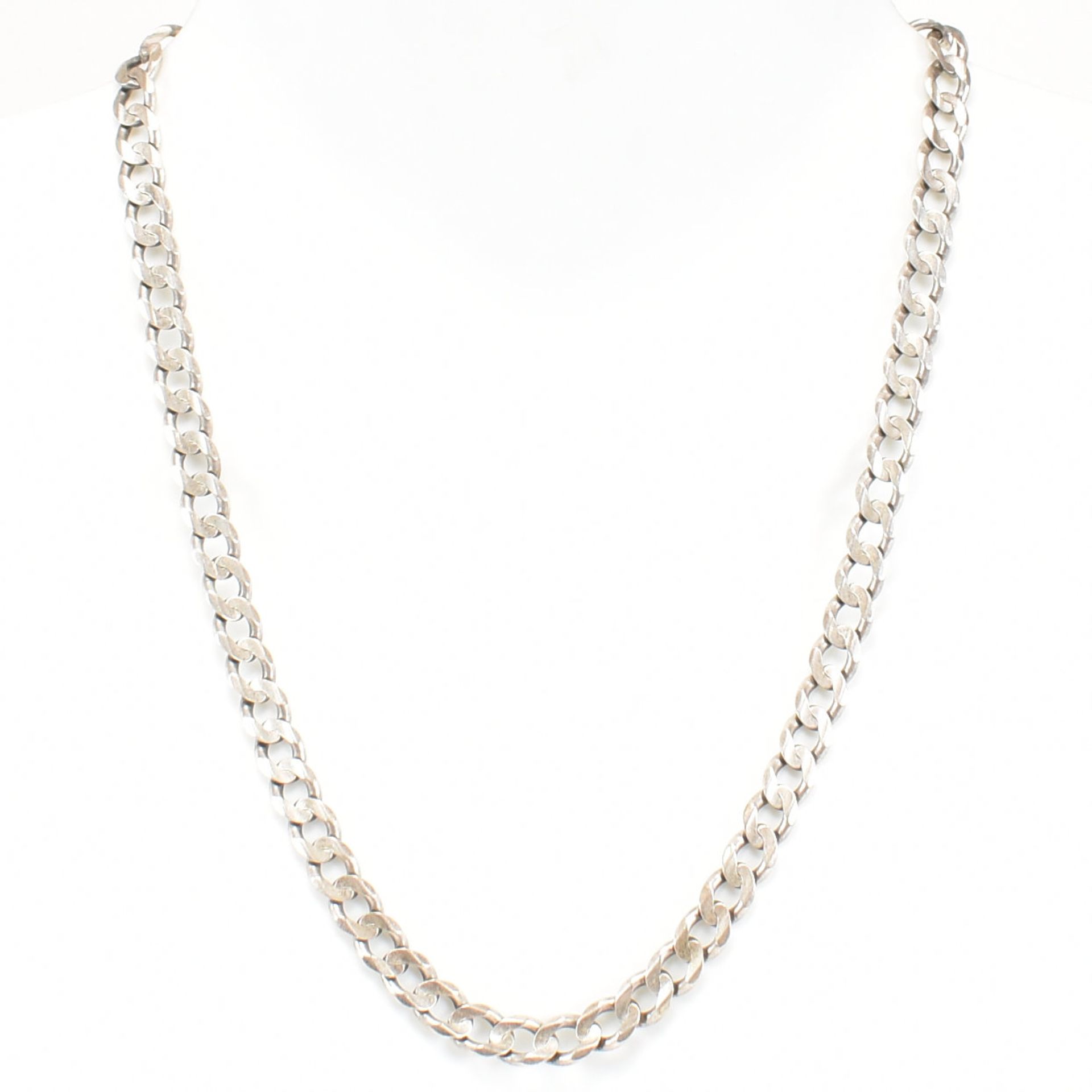 An Italian 925 silver curb link chain. The chain having a lobster claw ...