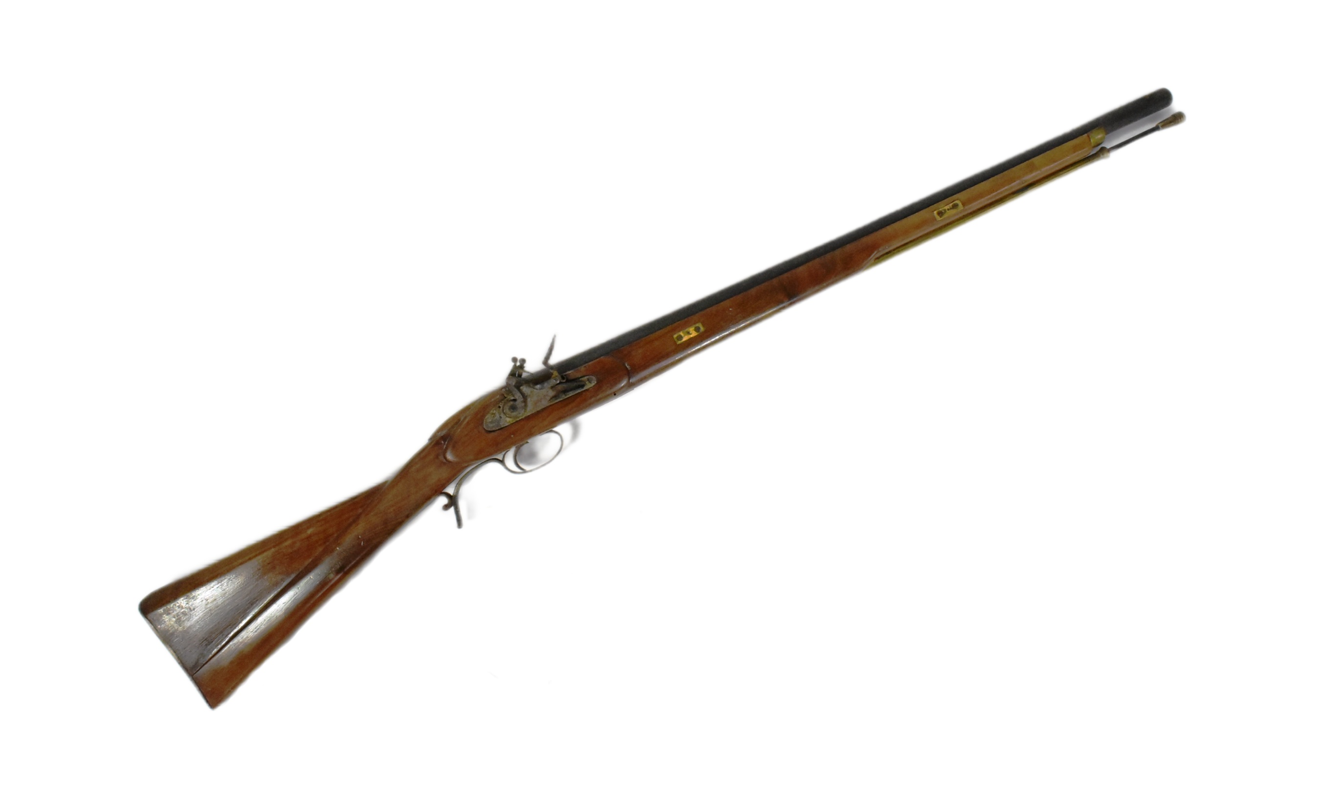 A 19th Century flintlock musket rifle. The barrel marked with a crowned ...