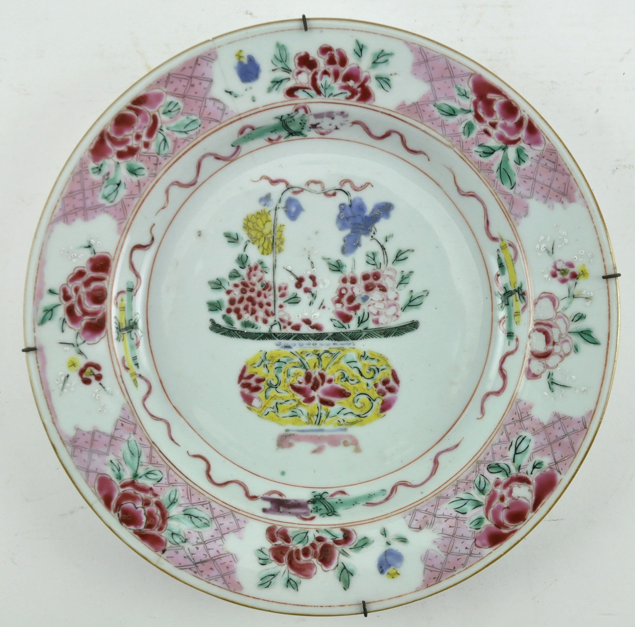 A Qing dynasty Qianlong period famille rose ceramic charger plate. The ...