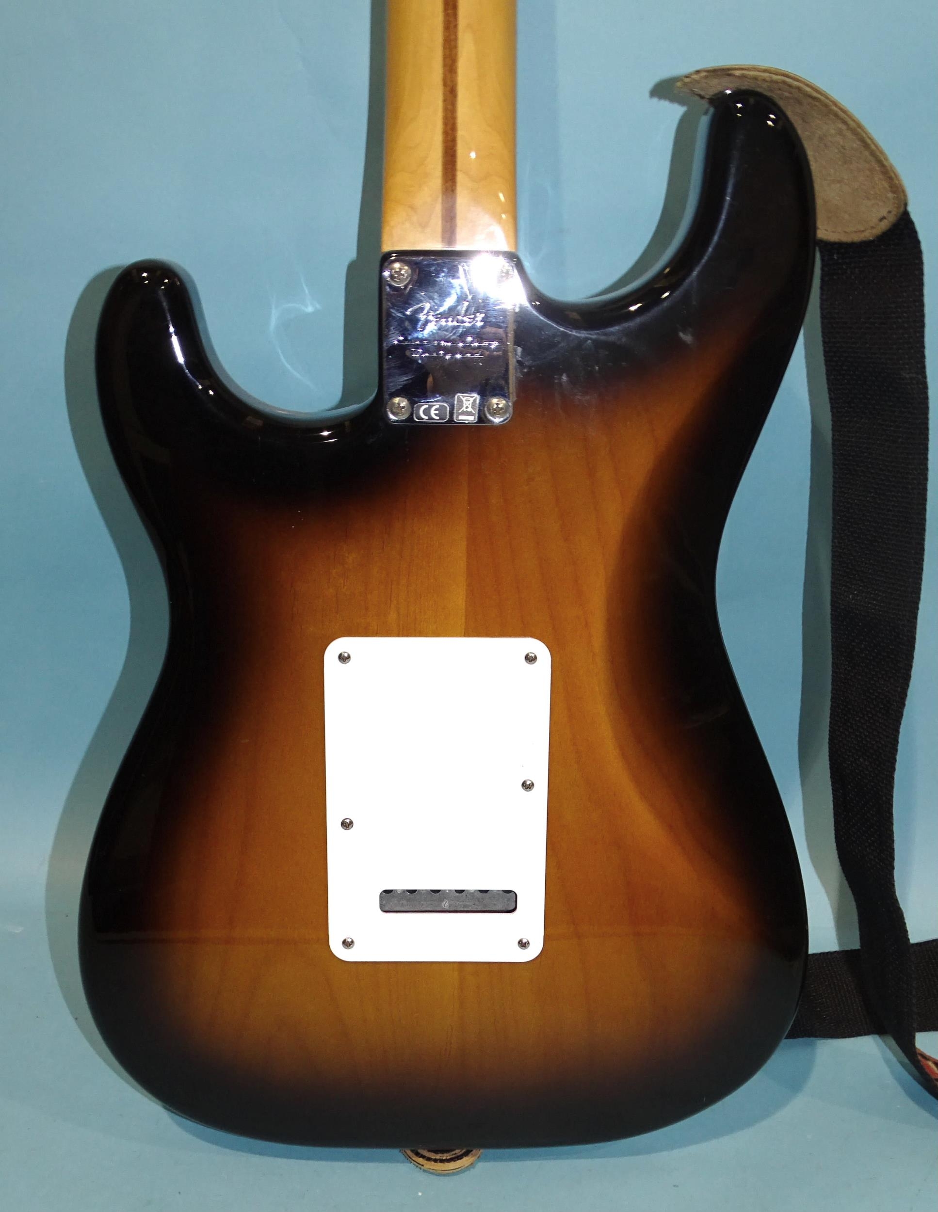 A Fender Stratocaster with original contoured body, made in Mexico ...