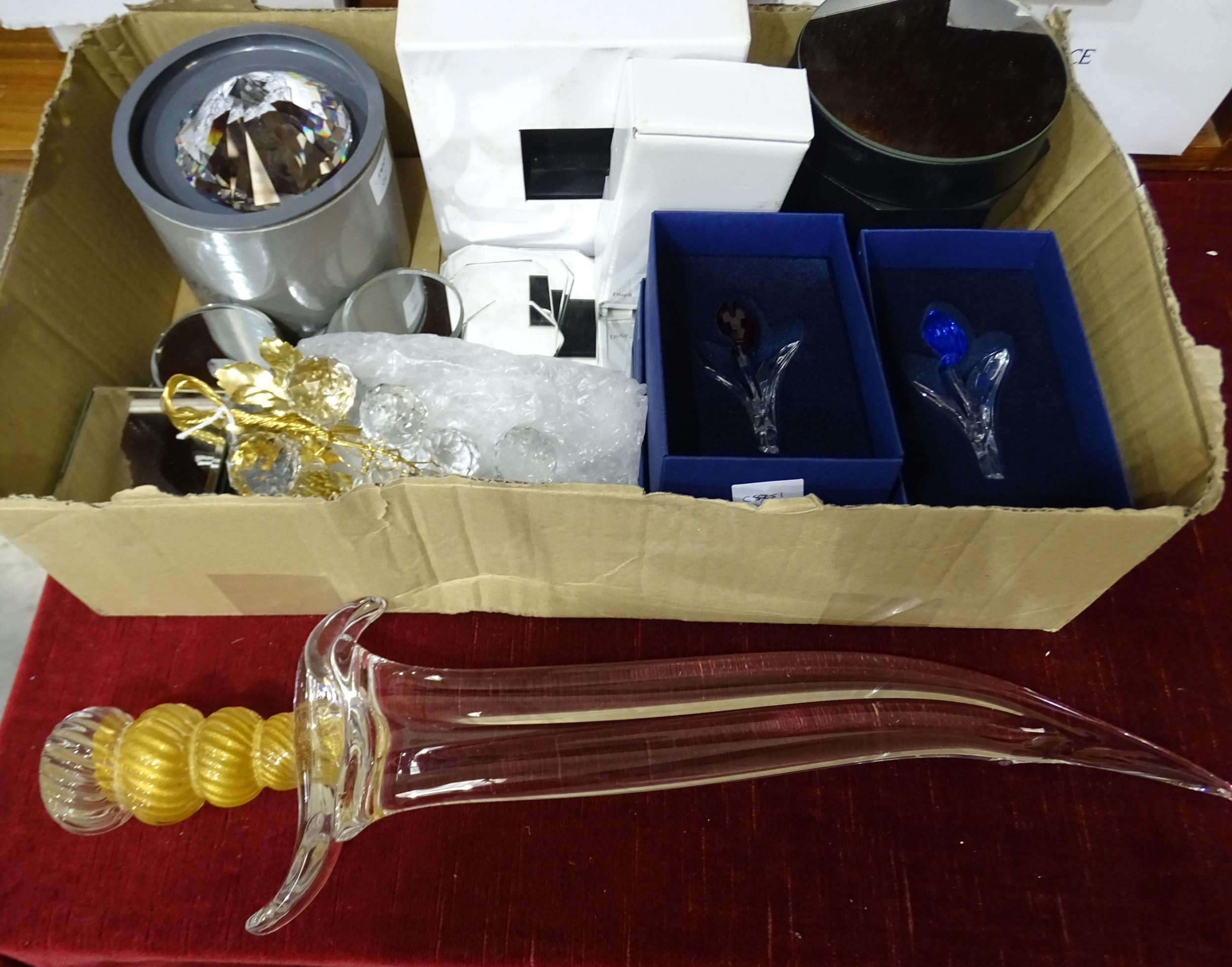 A Swarovski crystal glass and gilt metal bunch of grapes, (unboxed), a ...