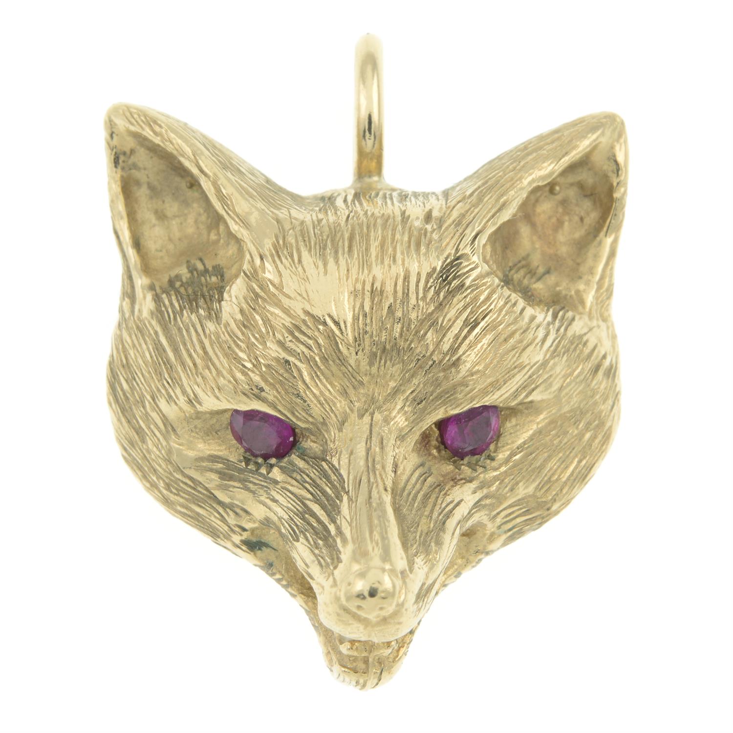 A 9ct gold fox head pendant, with synthetic ruby eye detail.Hallmarks ...