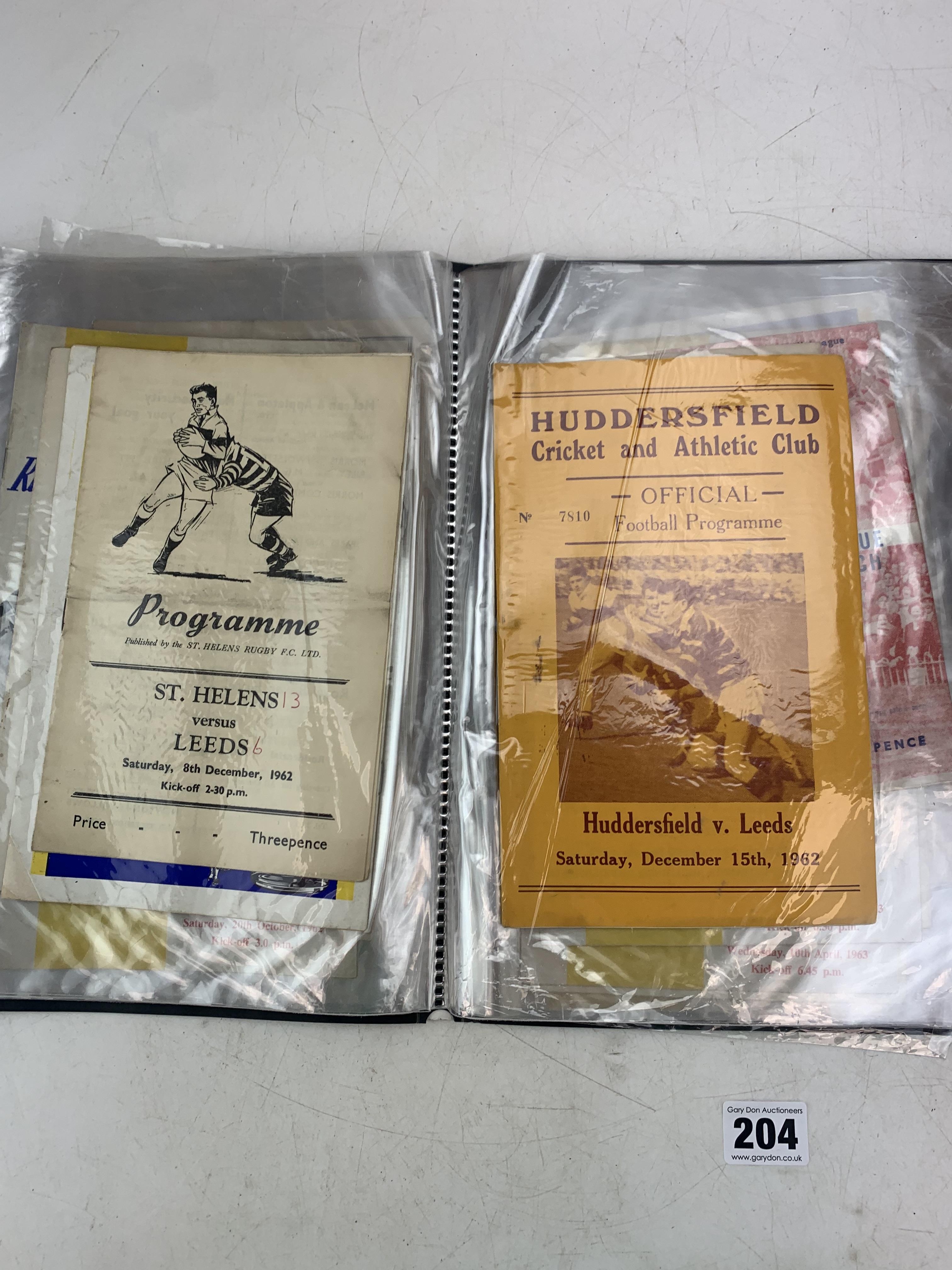 Folder of Leeds Rugby League programs - 34 copies of Home and Away 1962 ...