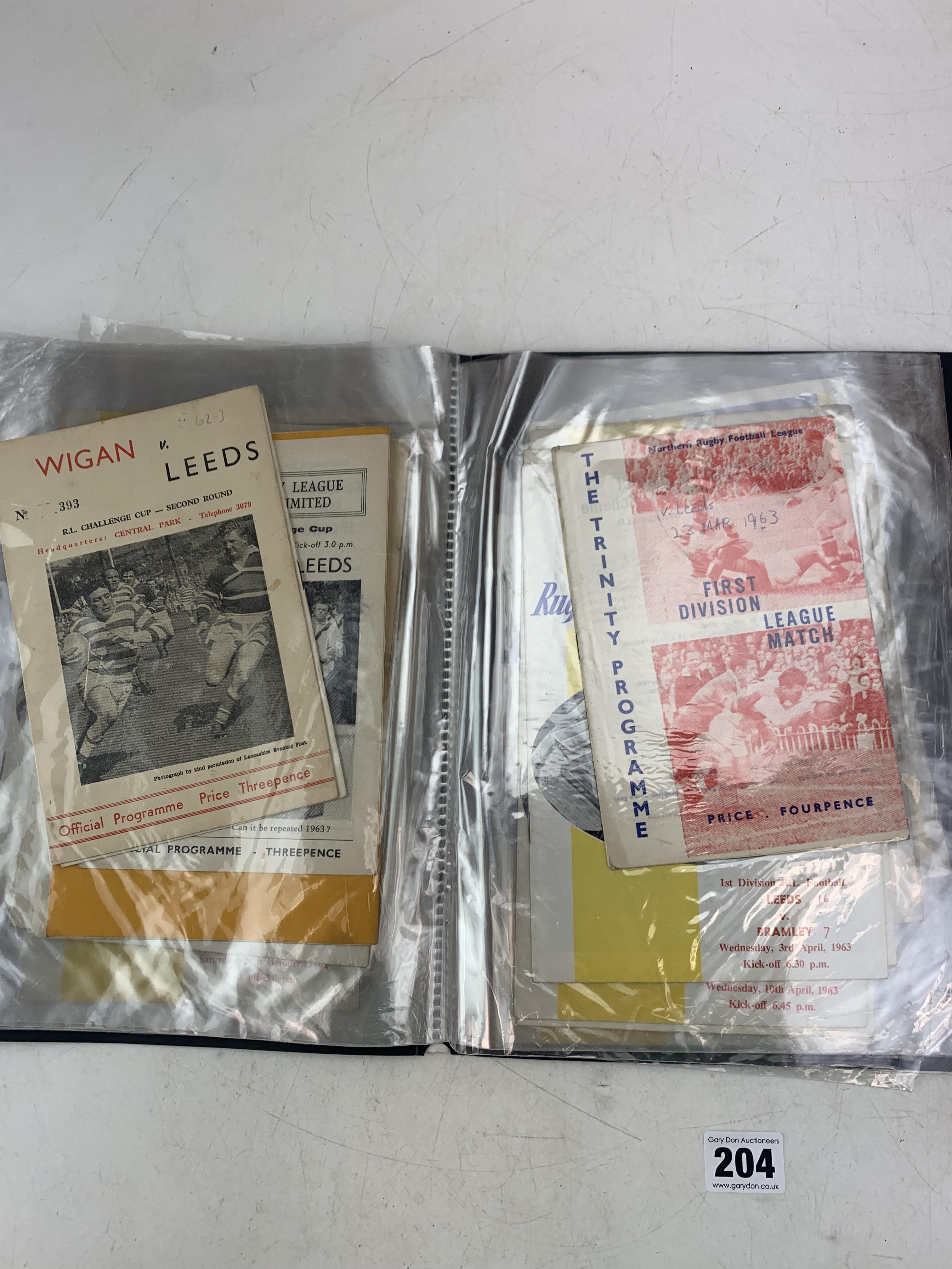 Folder of Leeds Rugby League programs - 34 copies of Home and Away 1962 ...