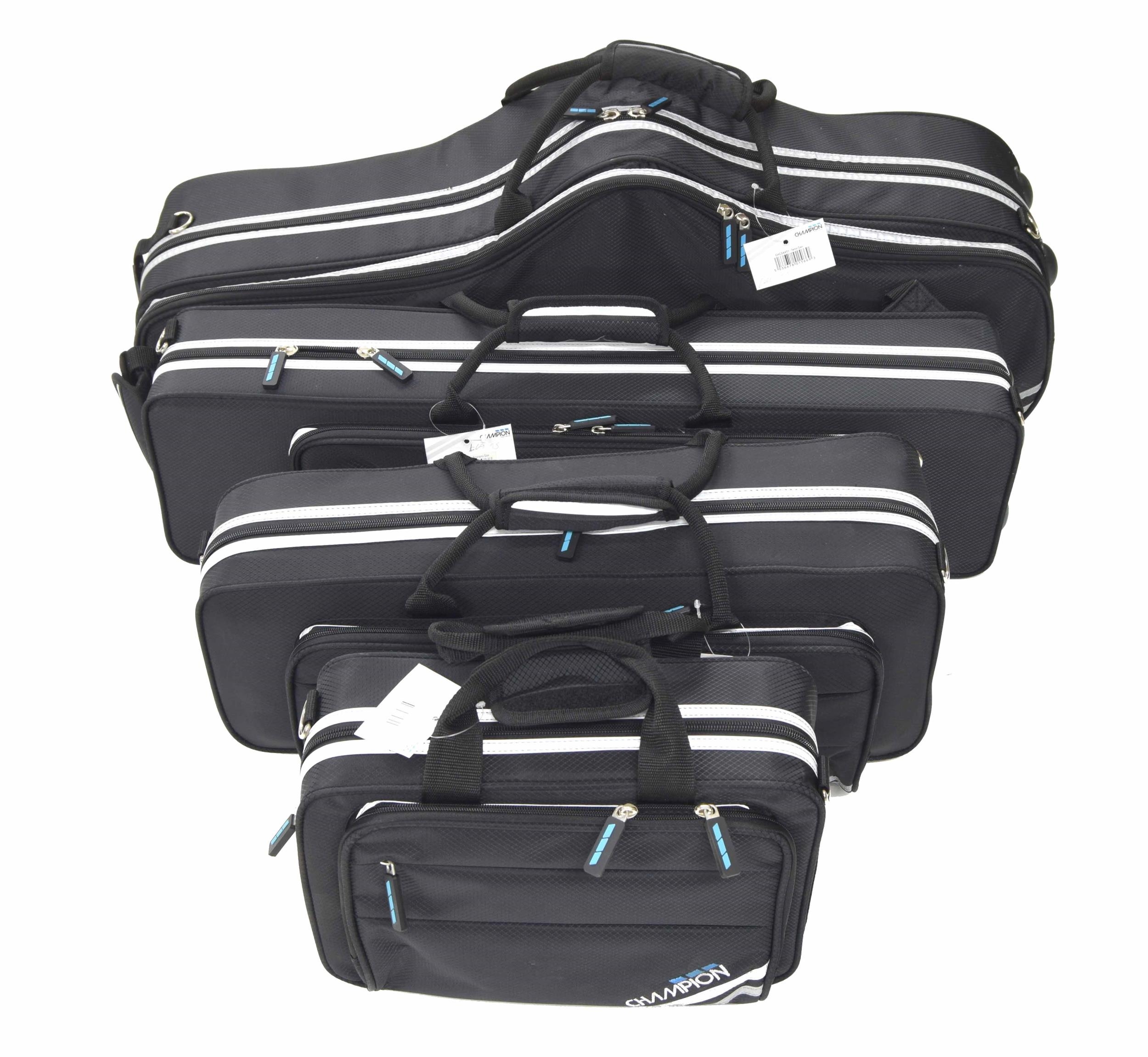 Four unused Champion instrument hard cases for: a tenor saxophone ...