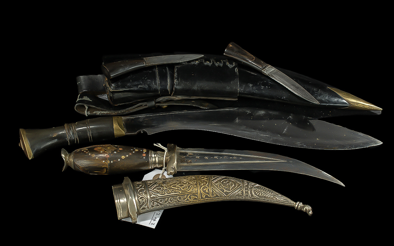 A Ghurka Kukri Chakmak and Karda Knives with horn handles, brass ...