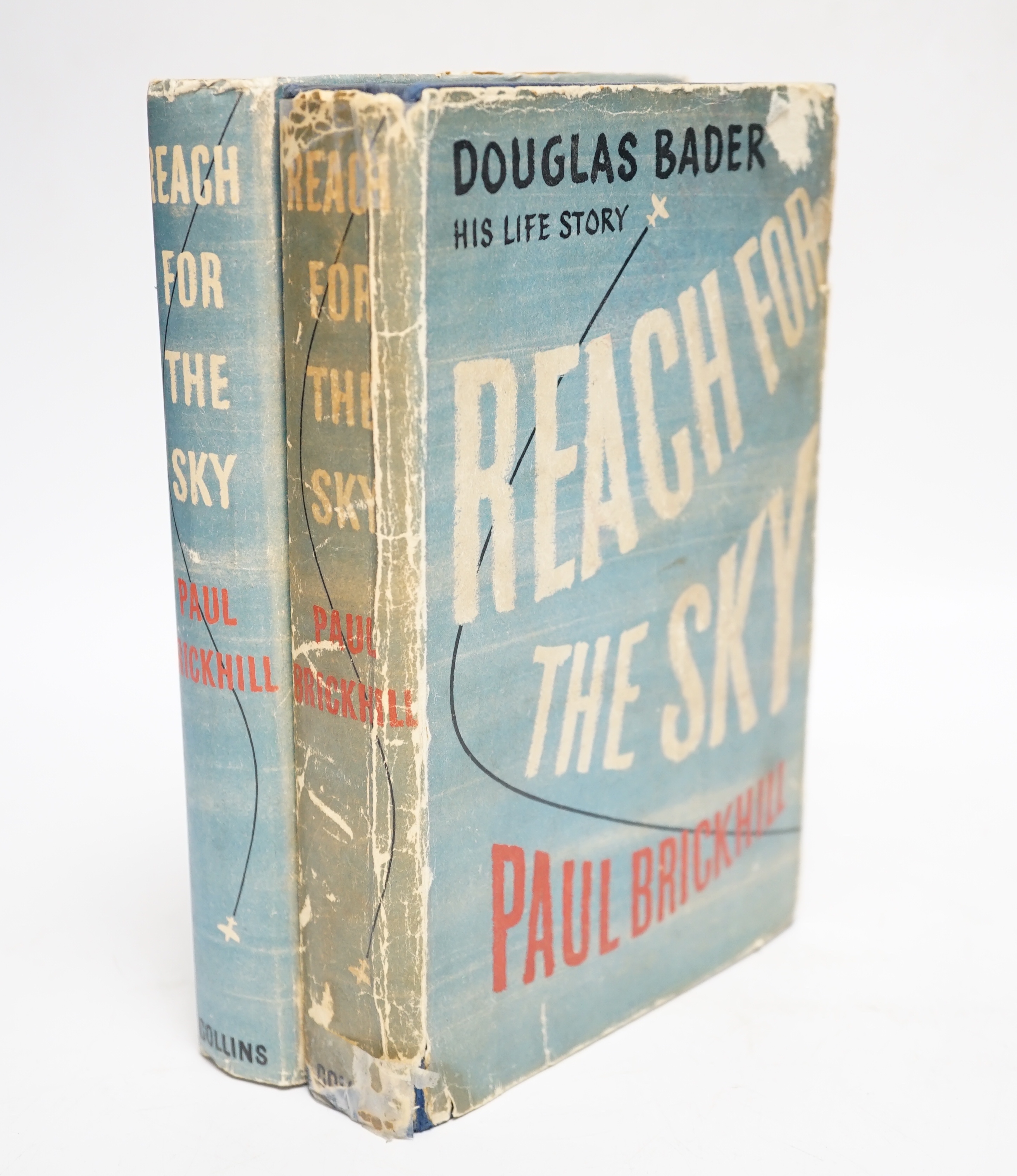 Two copies of Reach for the Skies by P Brickhill, one autographed by ...