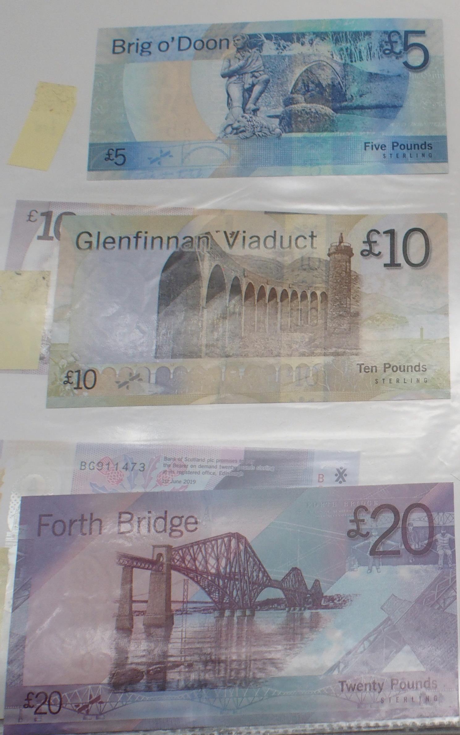 SCOTLAND a collection of Scottish banknotes with various denominations ...