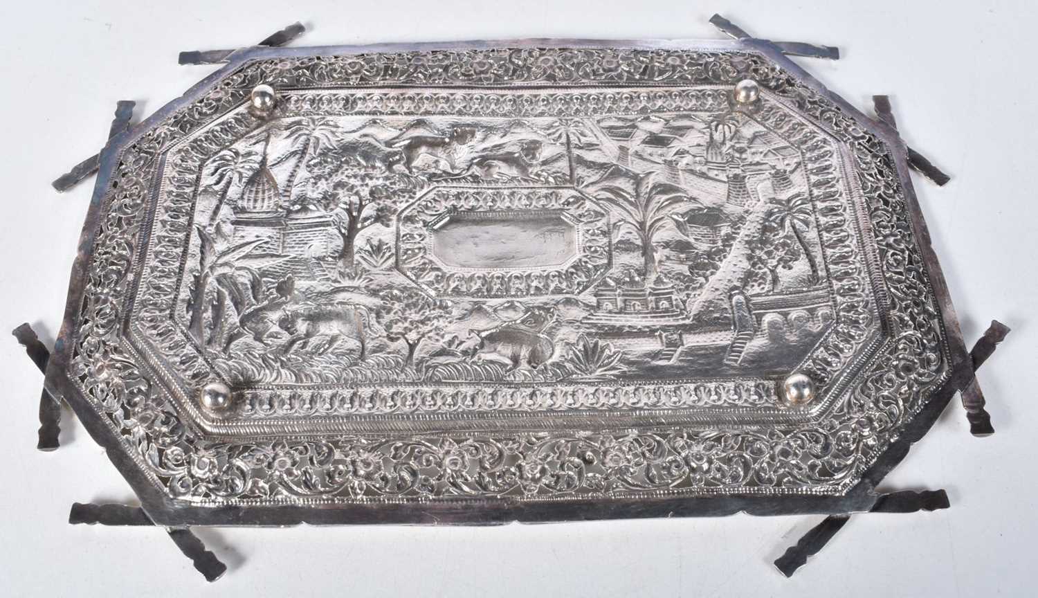 An Eastern Silver Trinket Tray embossed with village scenes and animals ...