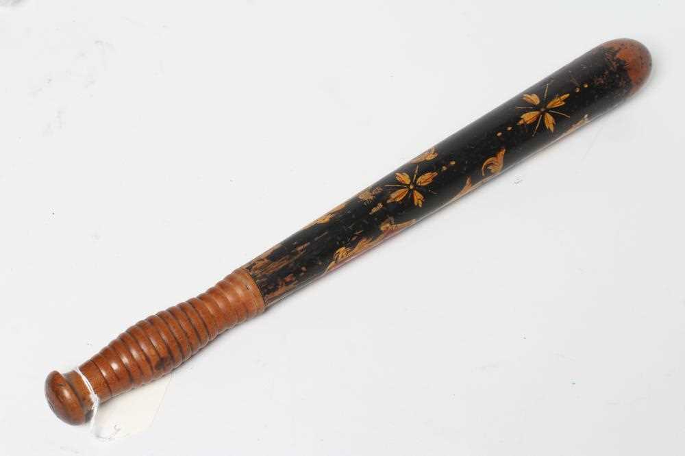 A VICTORIAN POLICE TRUNCHEON, with concealed 7 3/4" blade, ribbed wood ...