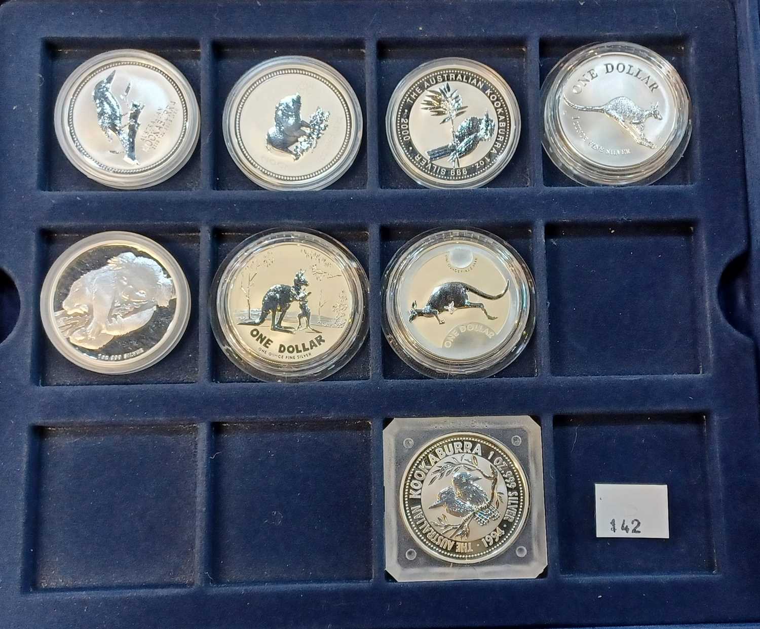 A collection of twenty four silver commemorative coins to include The ...