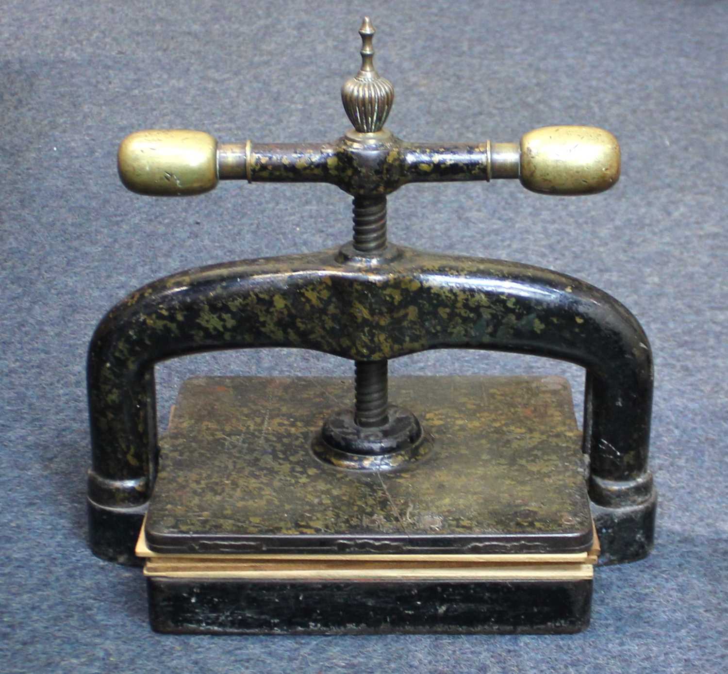 A cast iron book binding press with brass handles, size of press plate ...