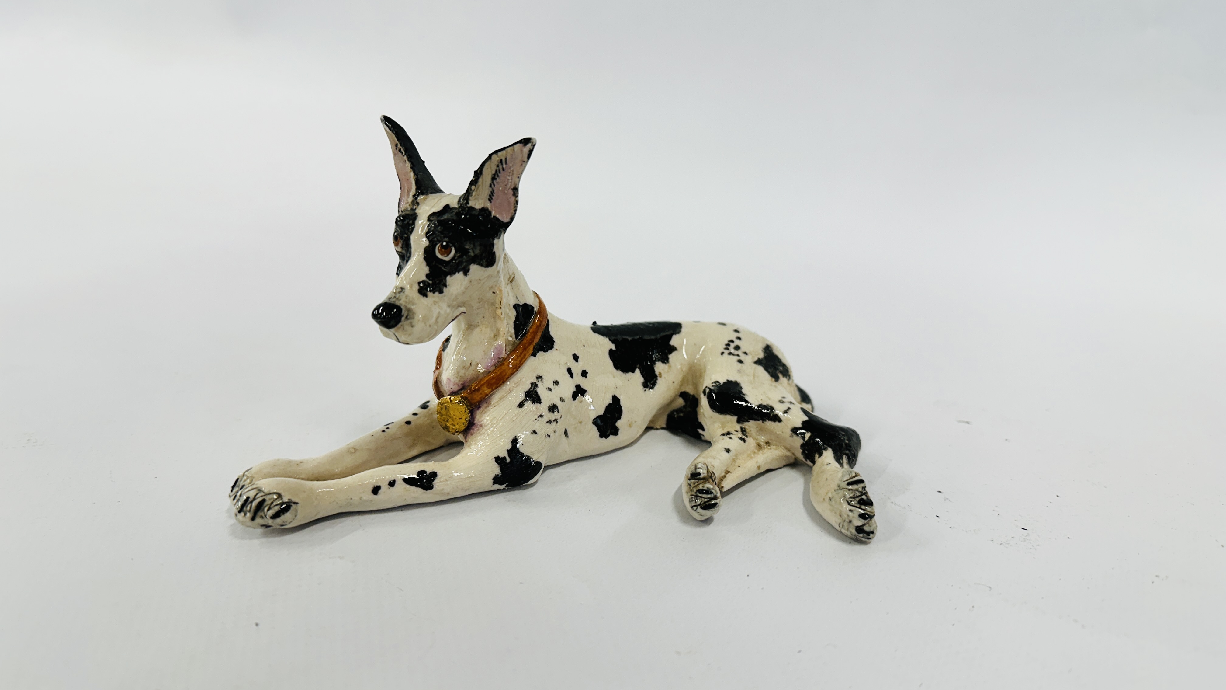 A STUDIO POTTERY STUDY OF A GREAT DANE SIGNED BASIL MATTHEWS.