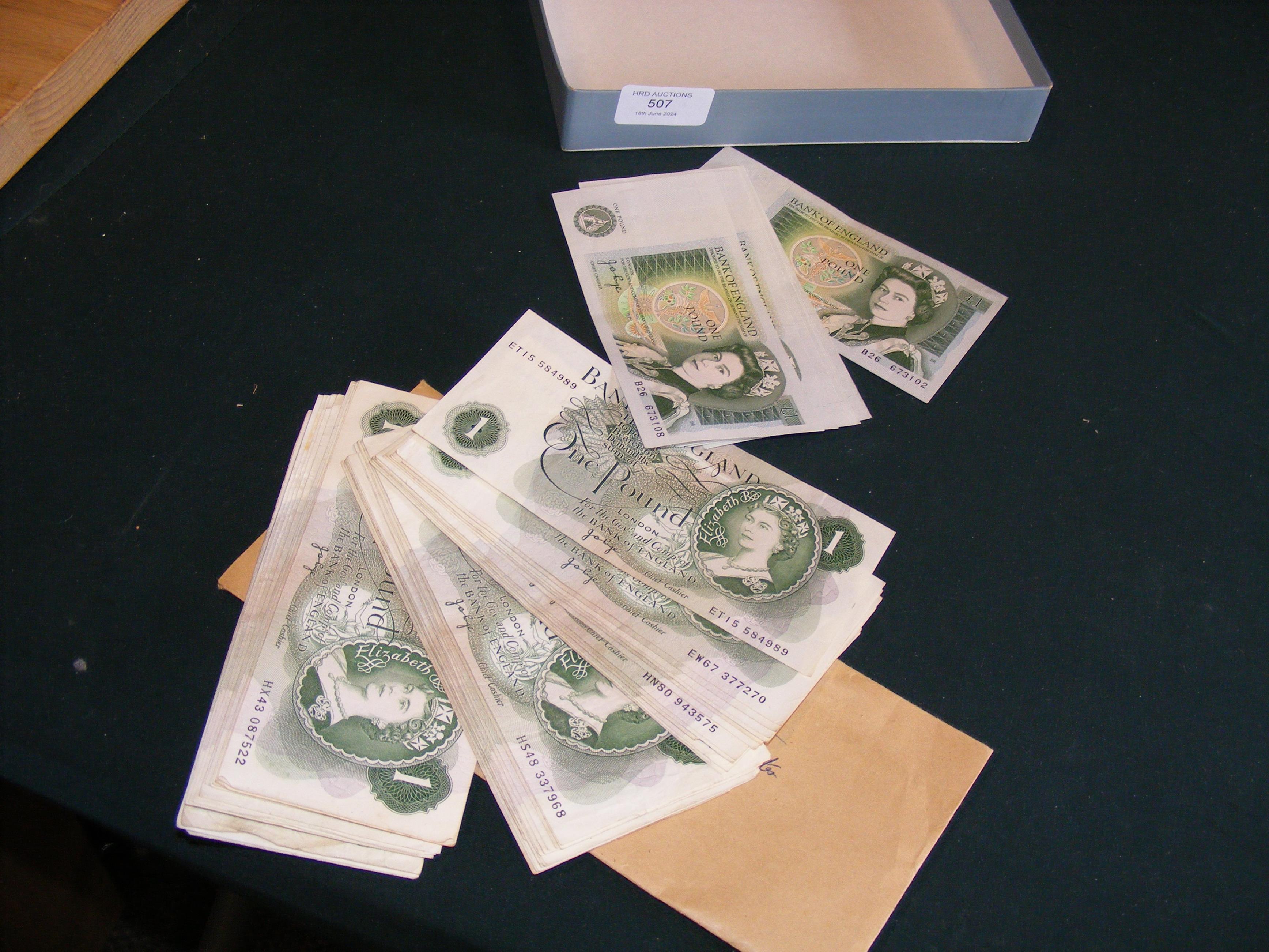 A selection of old Bank of England £1 notes, chief cashier John Page
