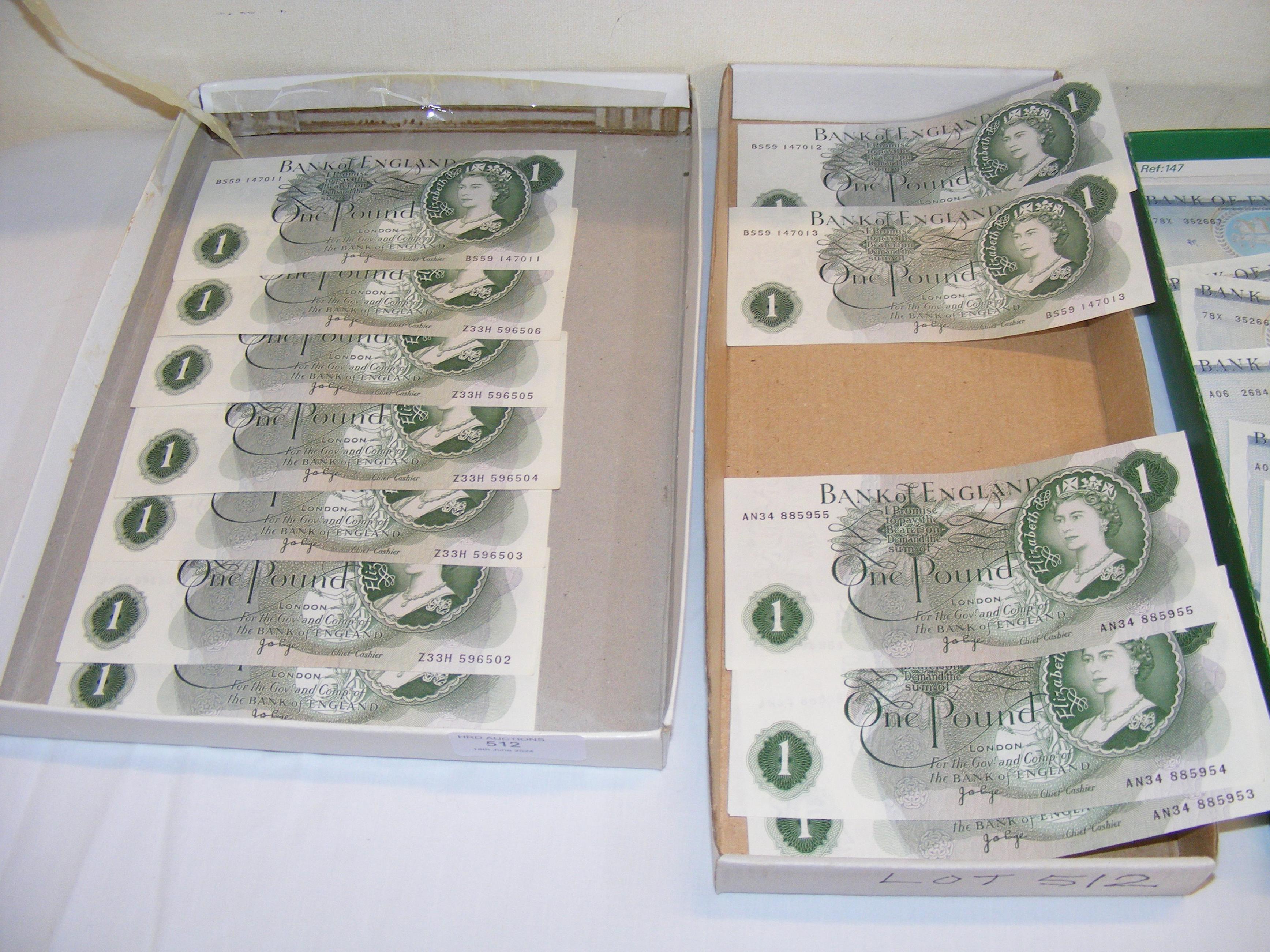 A selection of old Bank of England £1 notes, chief cashier John Page
