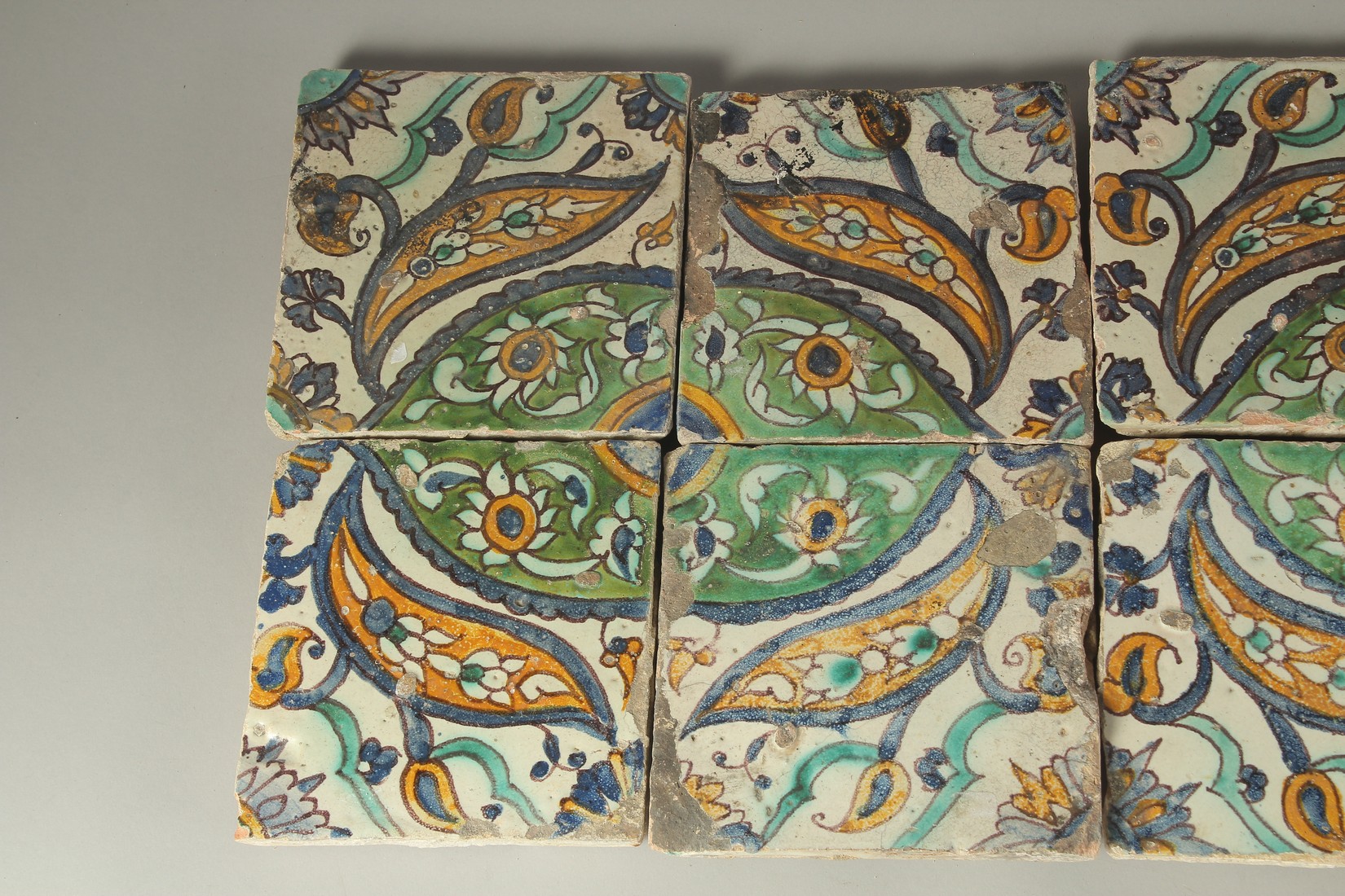 A PANEL OF EIGHT 18TH CENTURY NORTH AFRICAN TUNISIAN TILES.