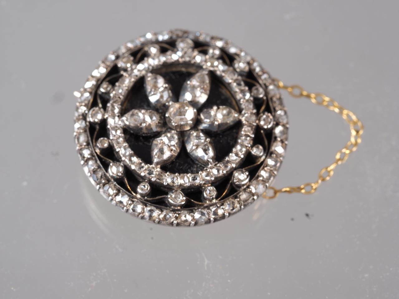 An early 19th century yellow metal circular memento brooch set old cut ...