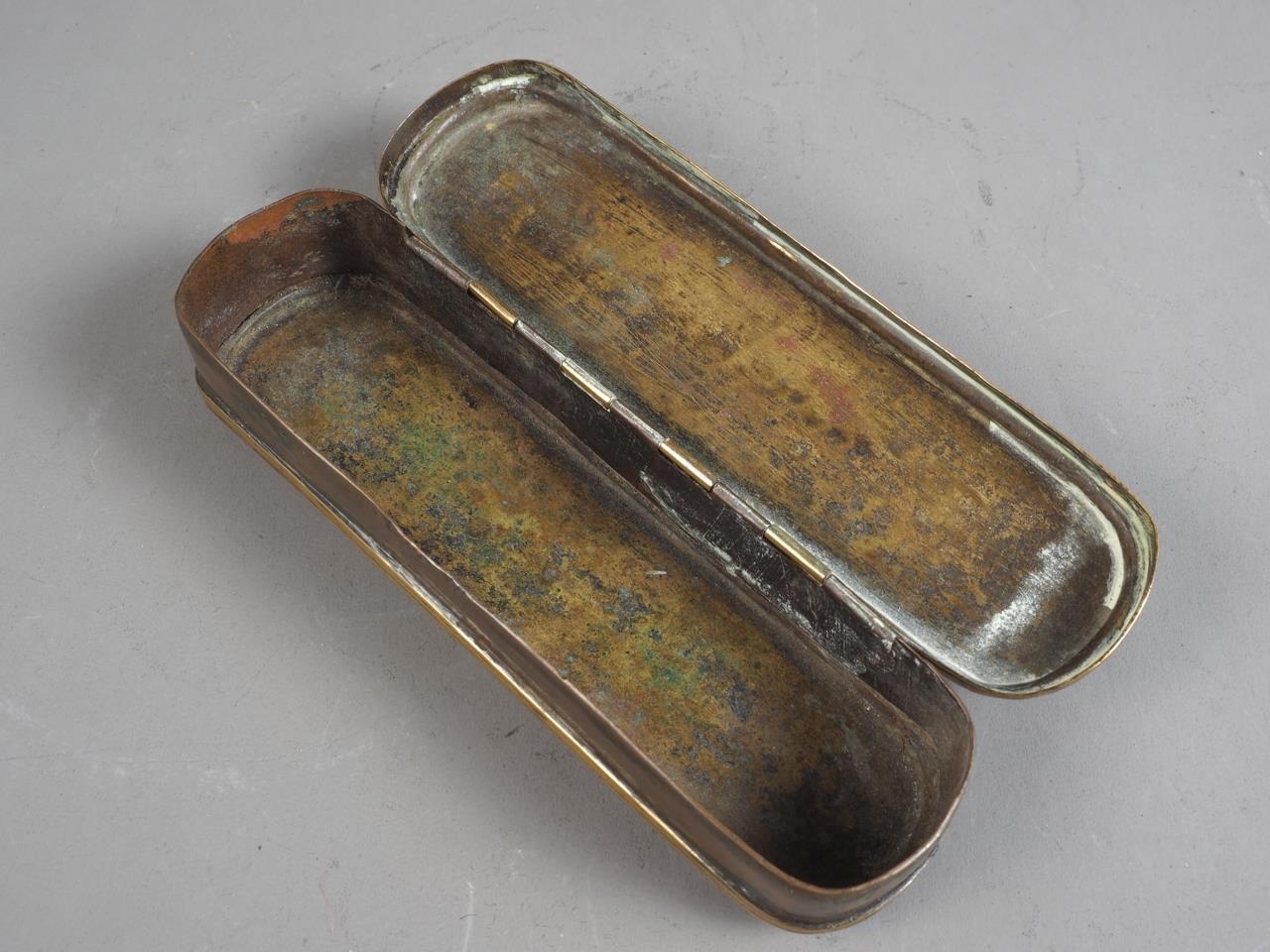 An early 18th century Dutch embossed brass tobacco box with portrait of ...