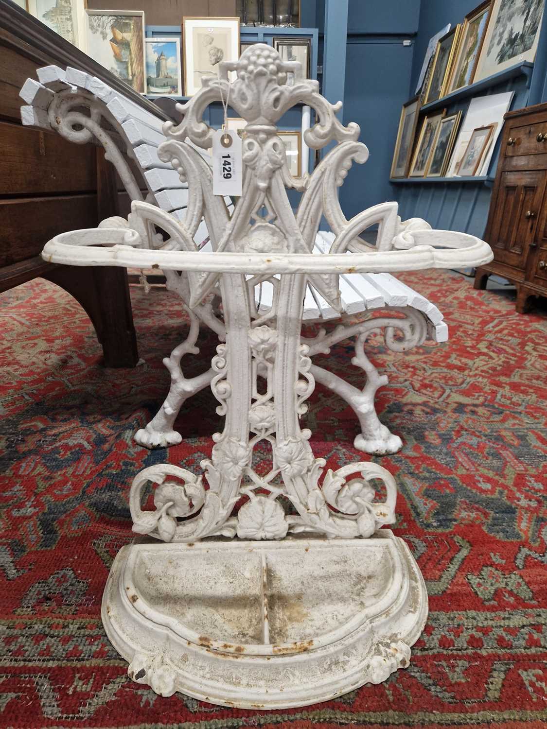 A white painted Coalbrookdale style iron stick stand