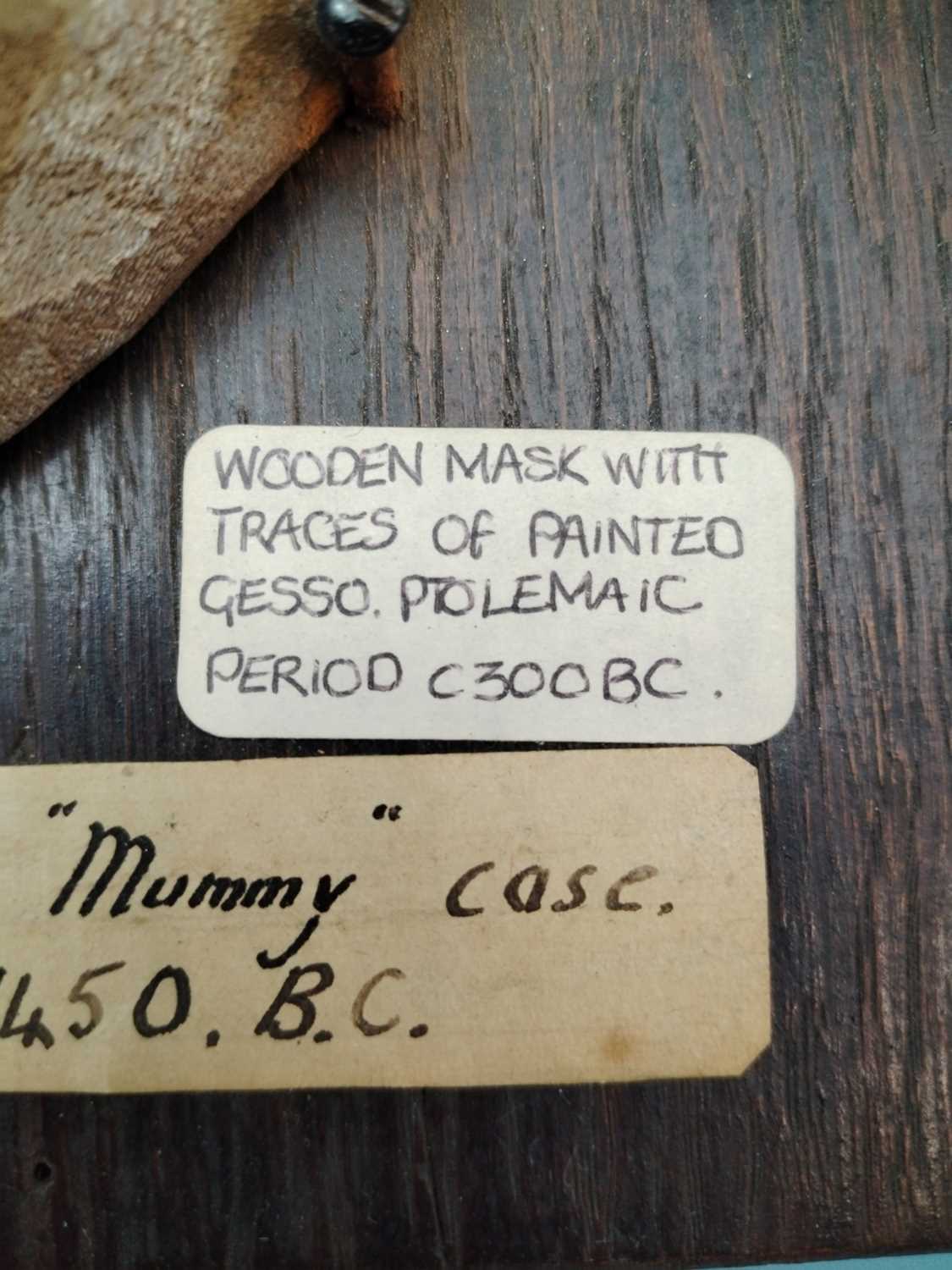 An Egyptian wooden mask from a Mummy casket, Ptolemaic period ( c.300 ...