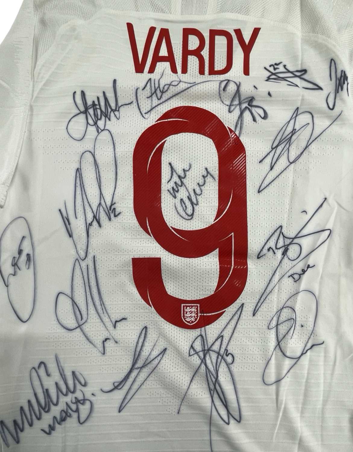 An England Football shirt [#9 - Vardy], bearing the signatures of ...