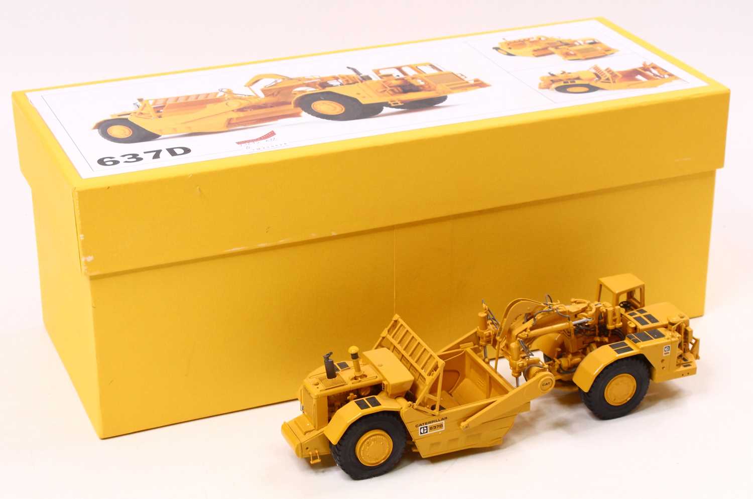 A Black Rat Models Caterpillar 637D Scraper housed in a polystyrene ...